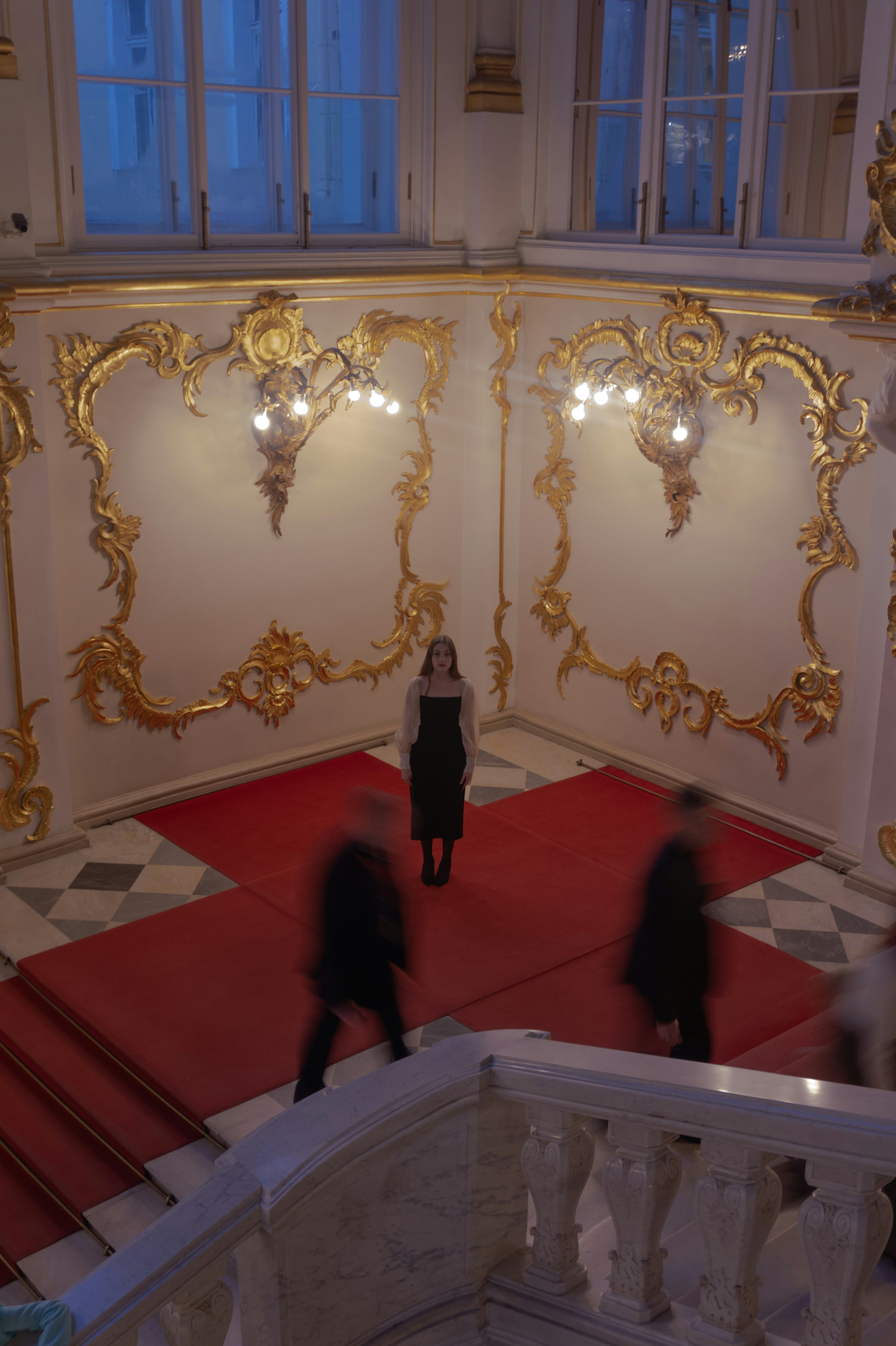 A person walking down a red carpet photo – Free Saint petersburg Image ...