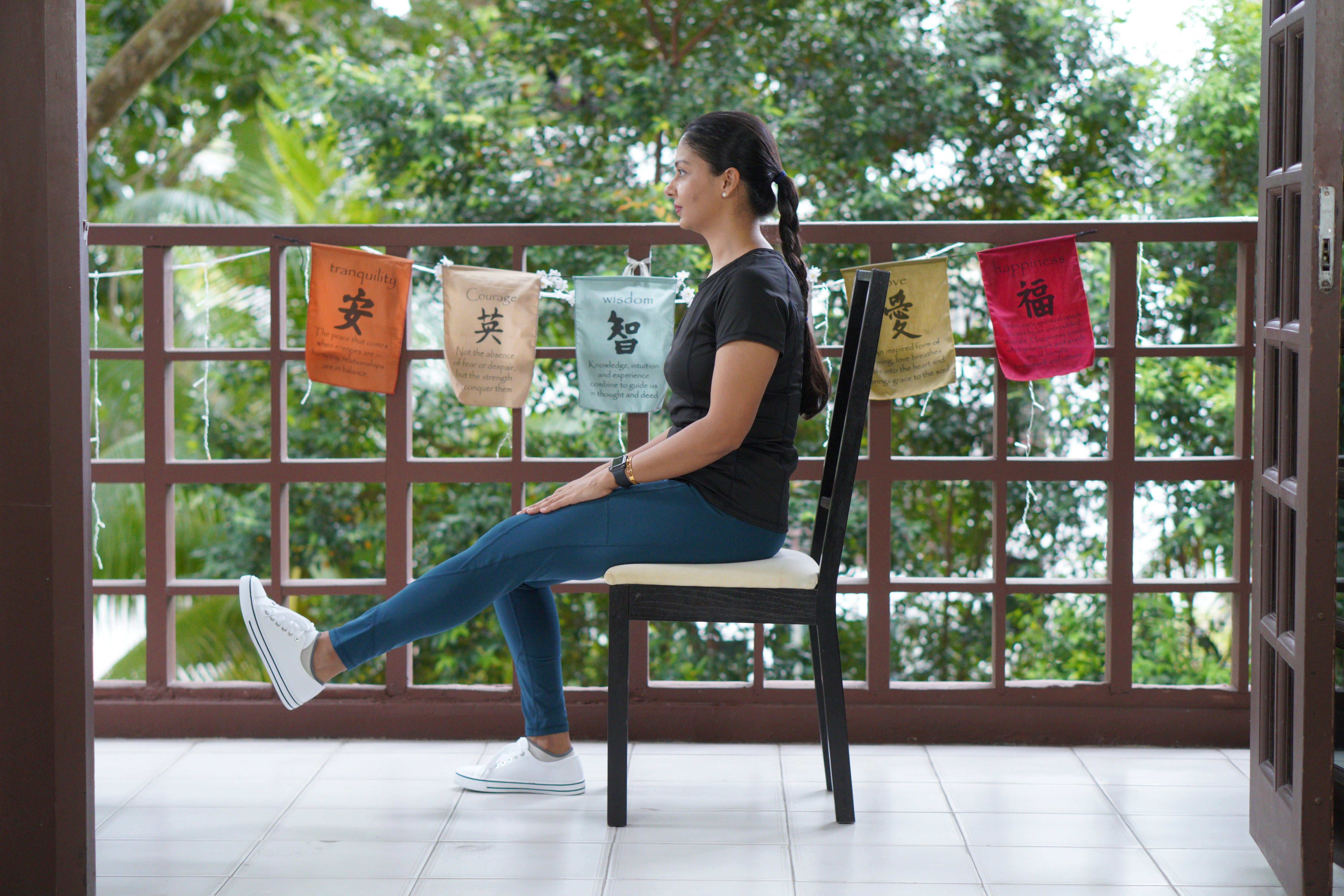 A person sitting on a chair holding a bucket of popcorn photo – Free # ...