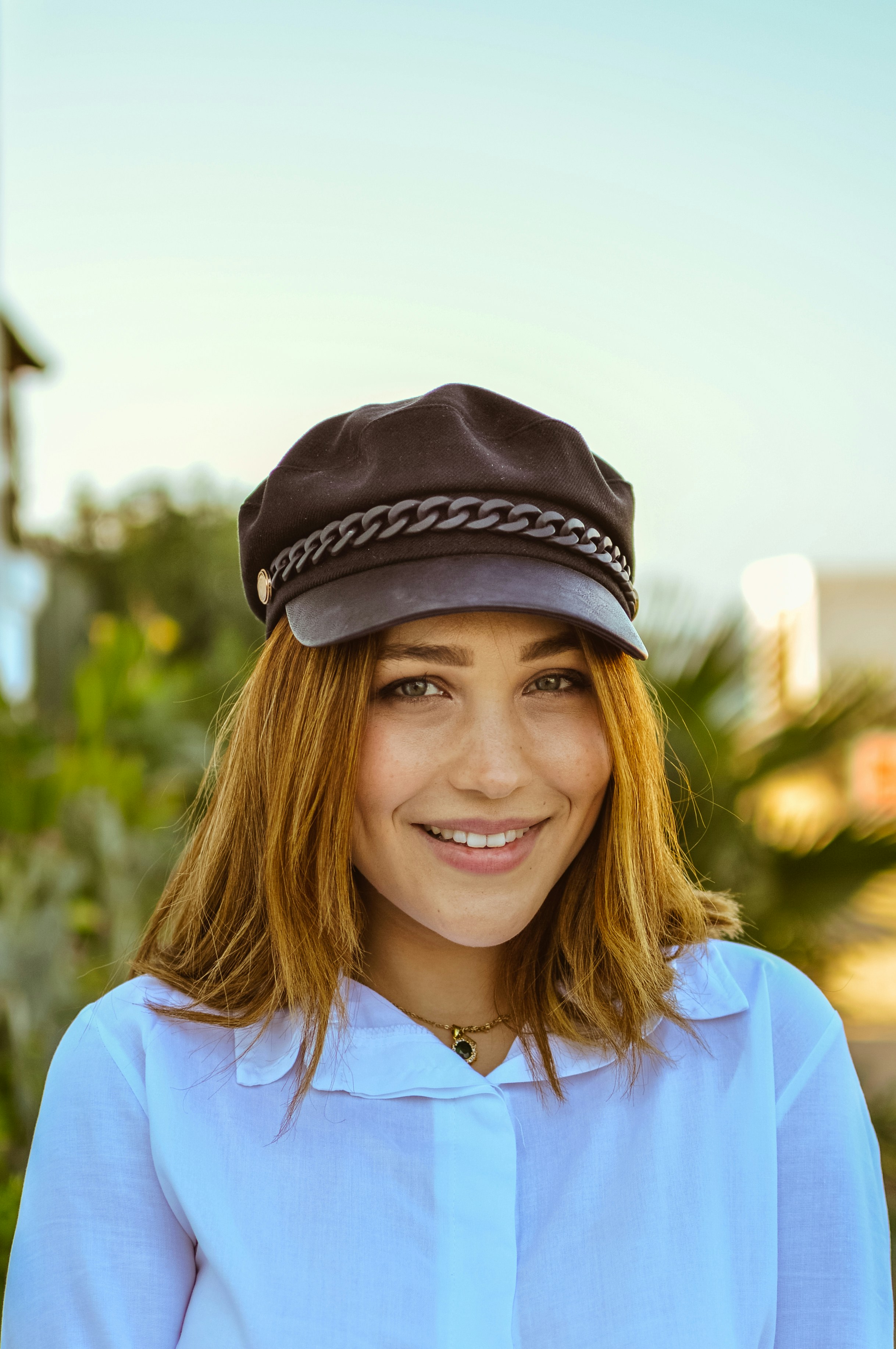 A person wearing a hat photo – Free Face Image on Unsplash