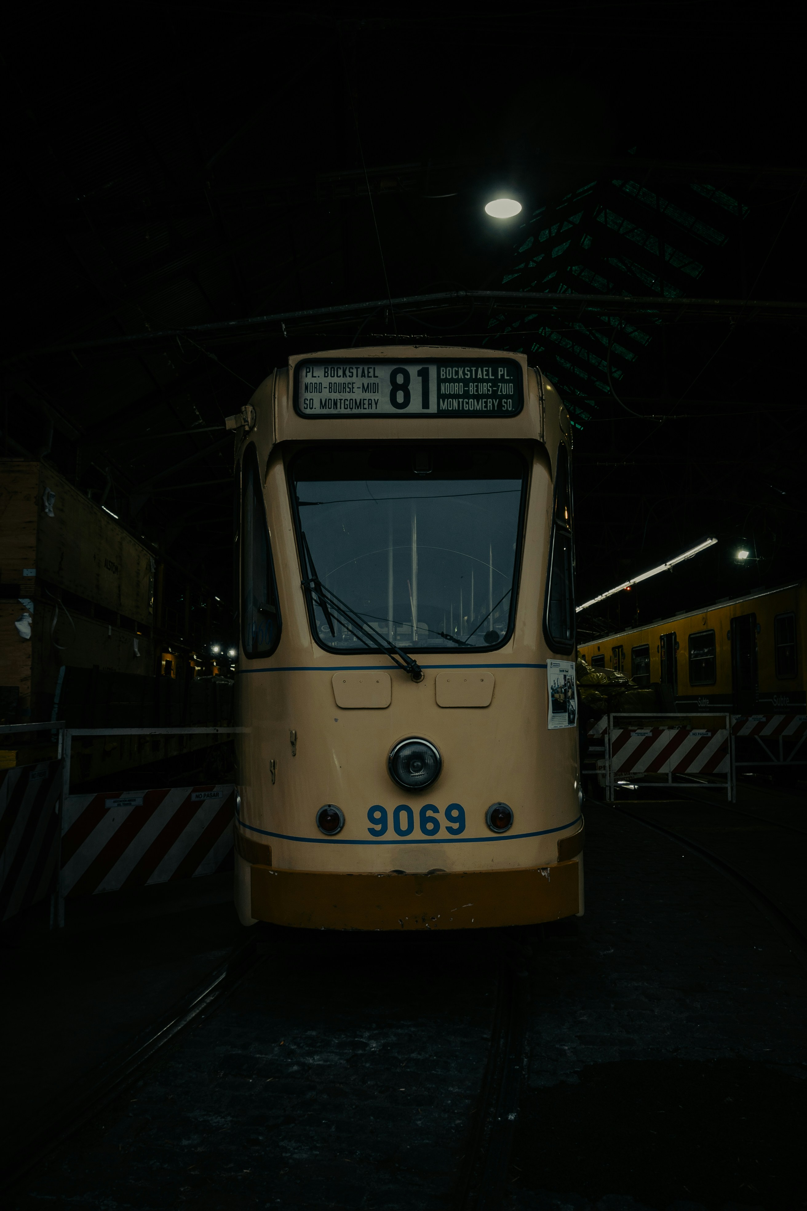 Front-Face in the Dark: Tram 9069 Pierces the Quiet Depot