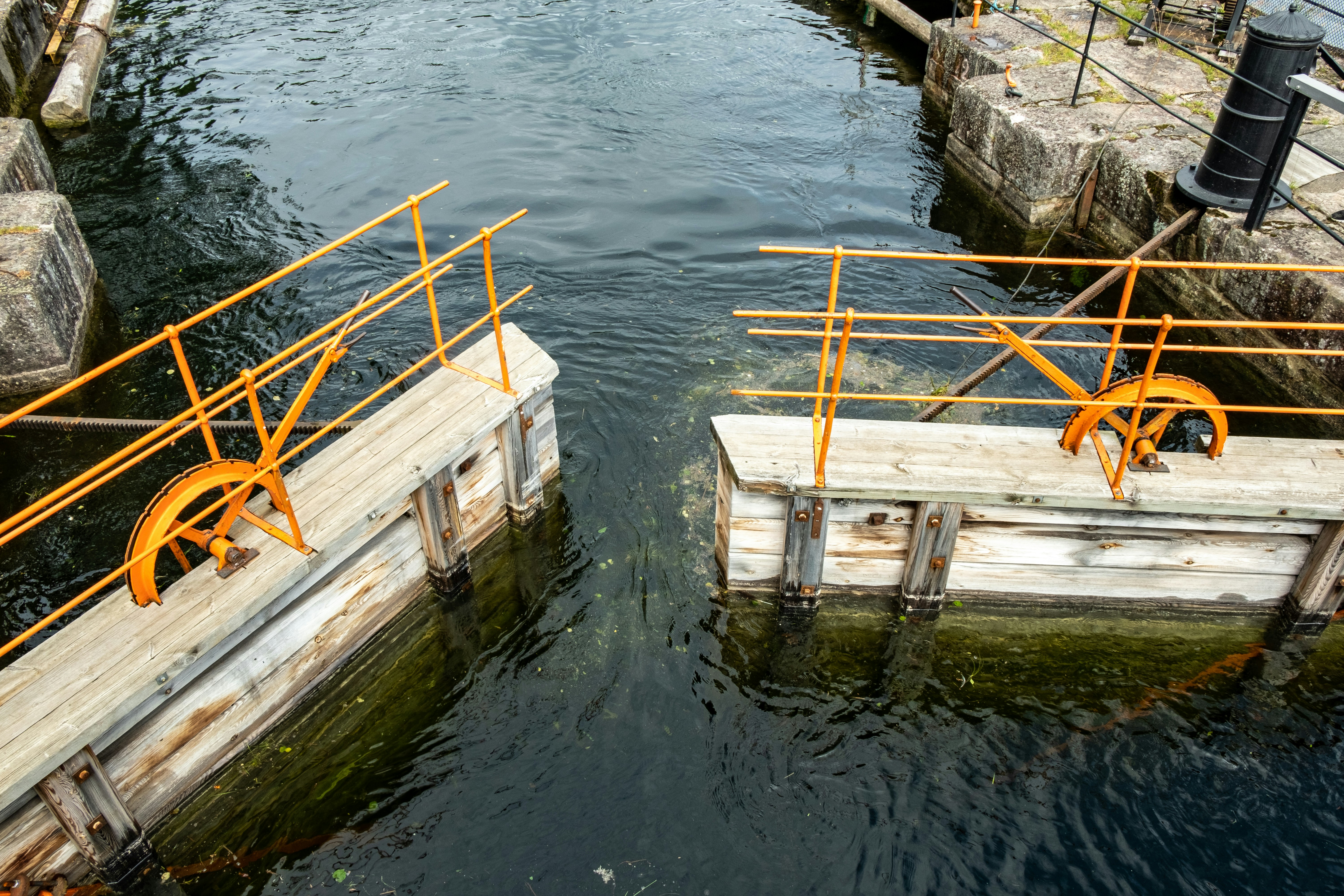 A dock with a yellow railing photo – Free Scenery Image on Unsplash