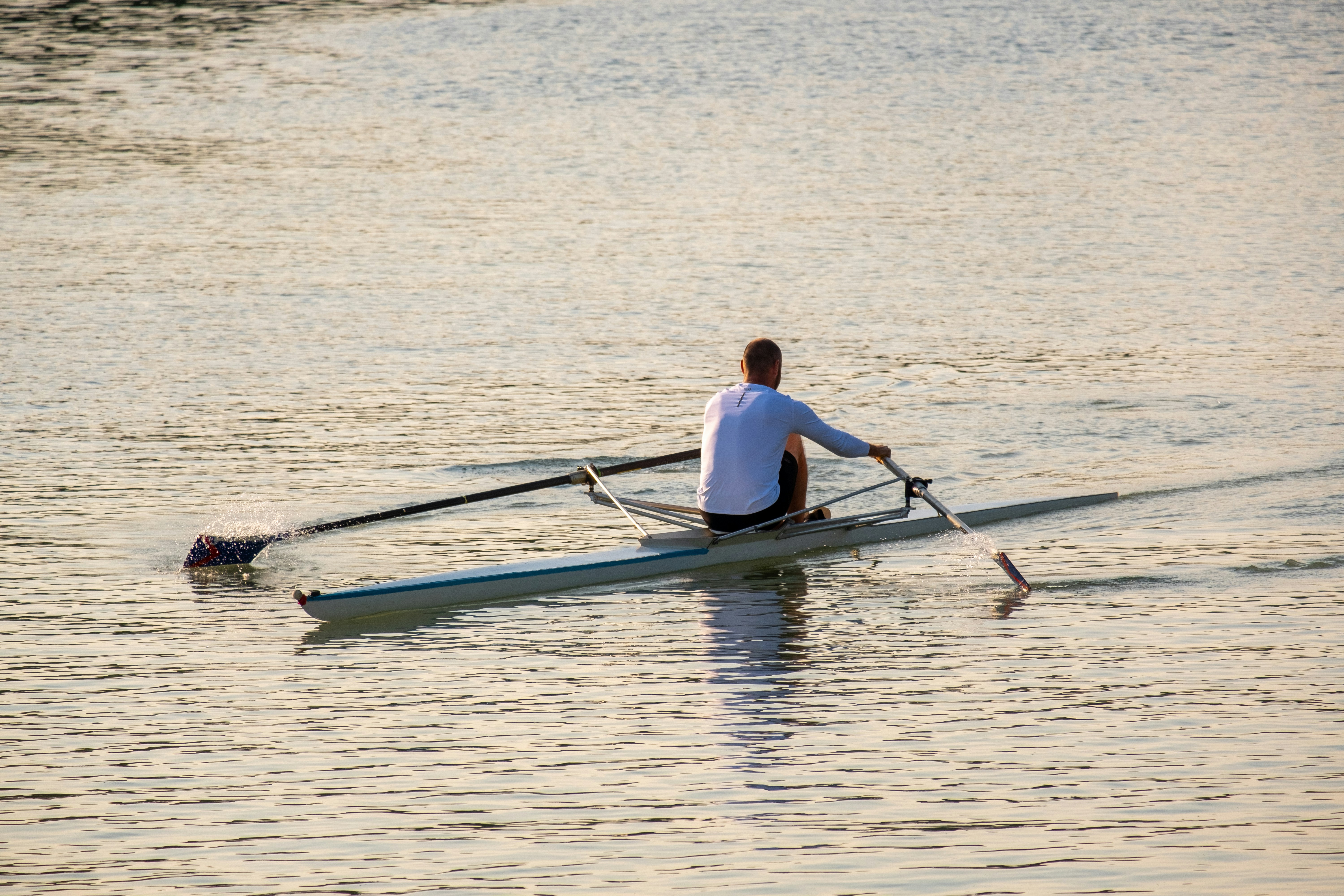 A man rowing a boat photo – Free Hungary Image on Unsplash