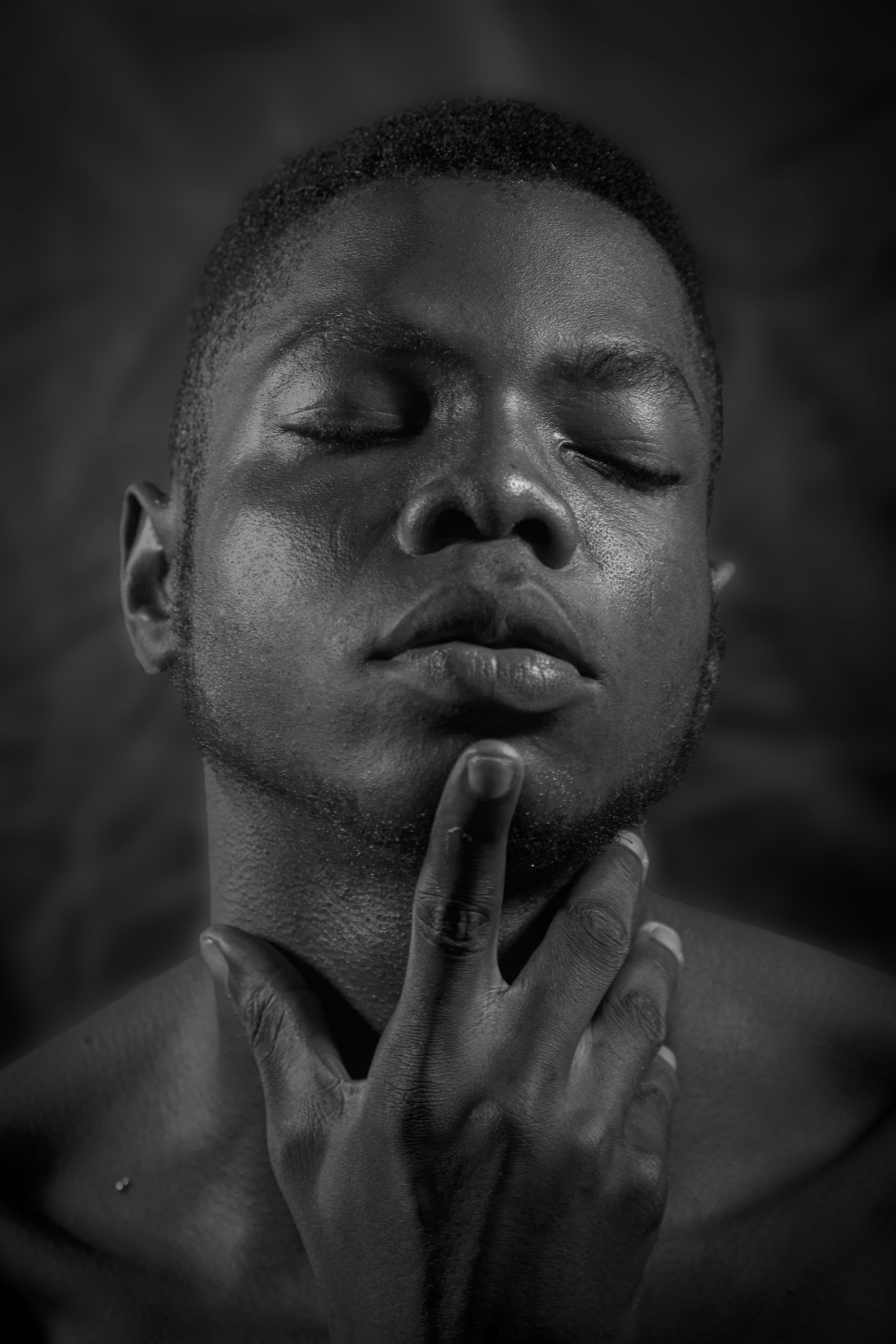 A man with his hand on his face photo – Free Portrait Image on Unsplash