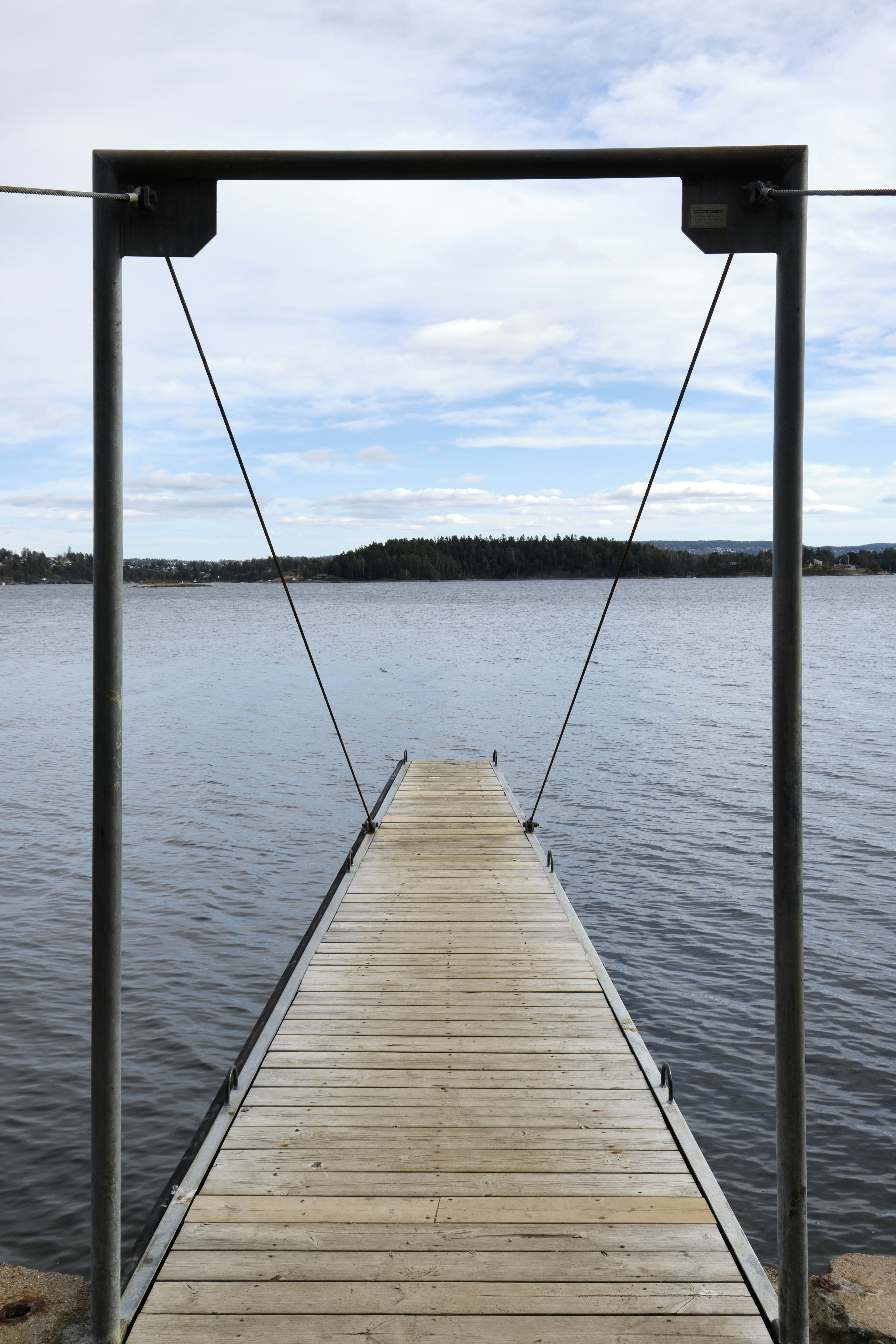 A wooden dock over water photo – Free Water Image on Unsplash