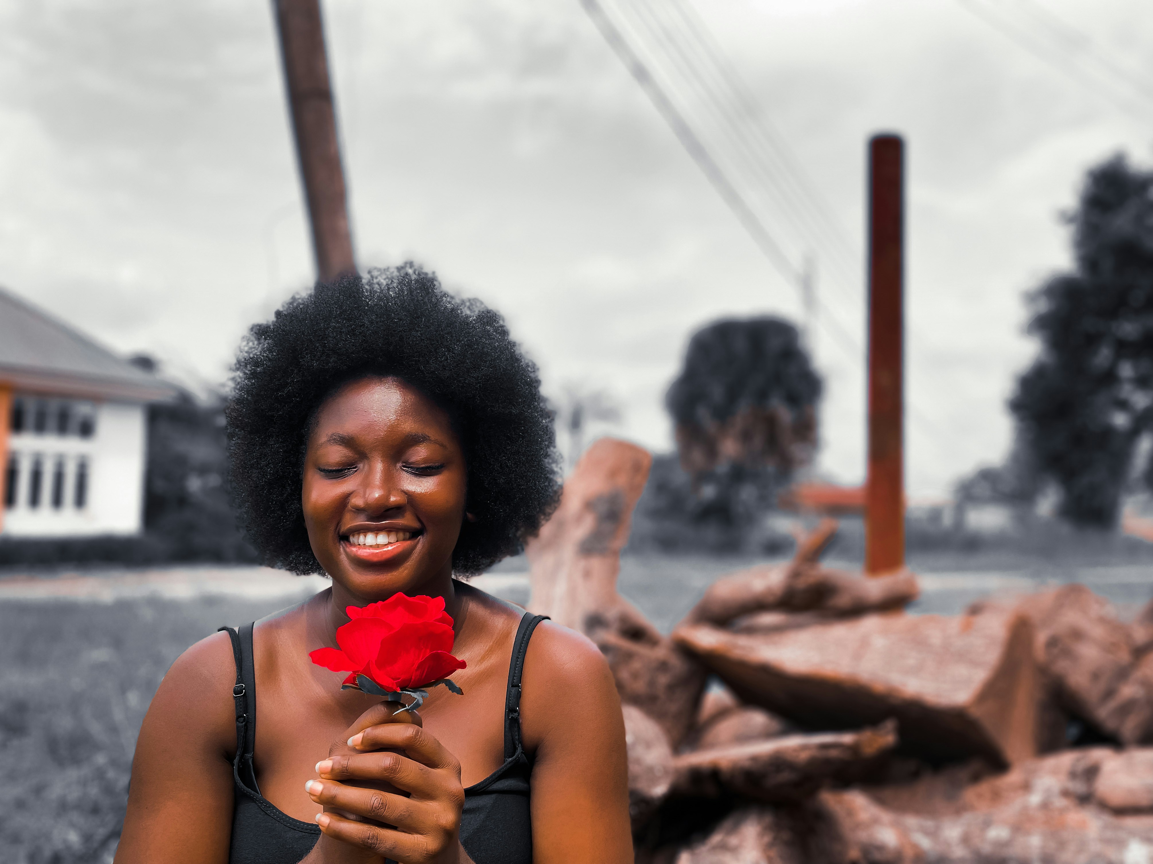 a person holding a rose