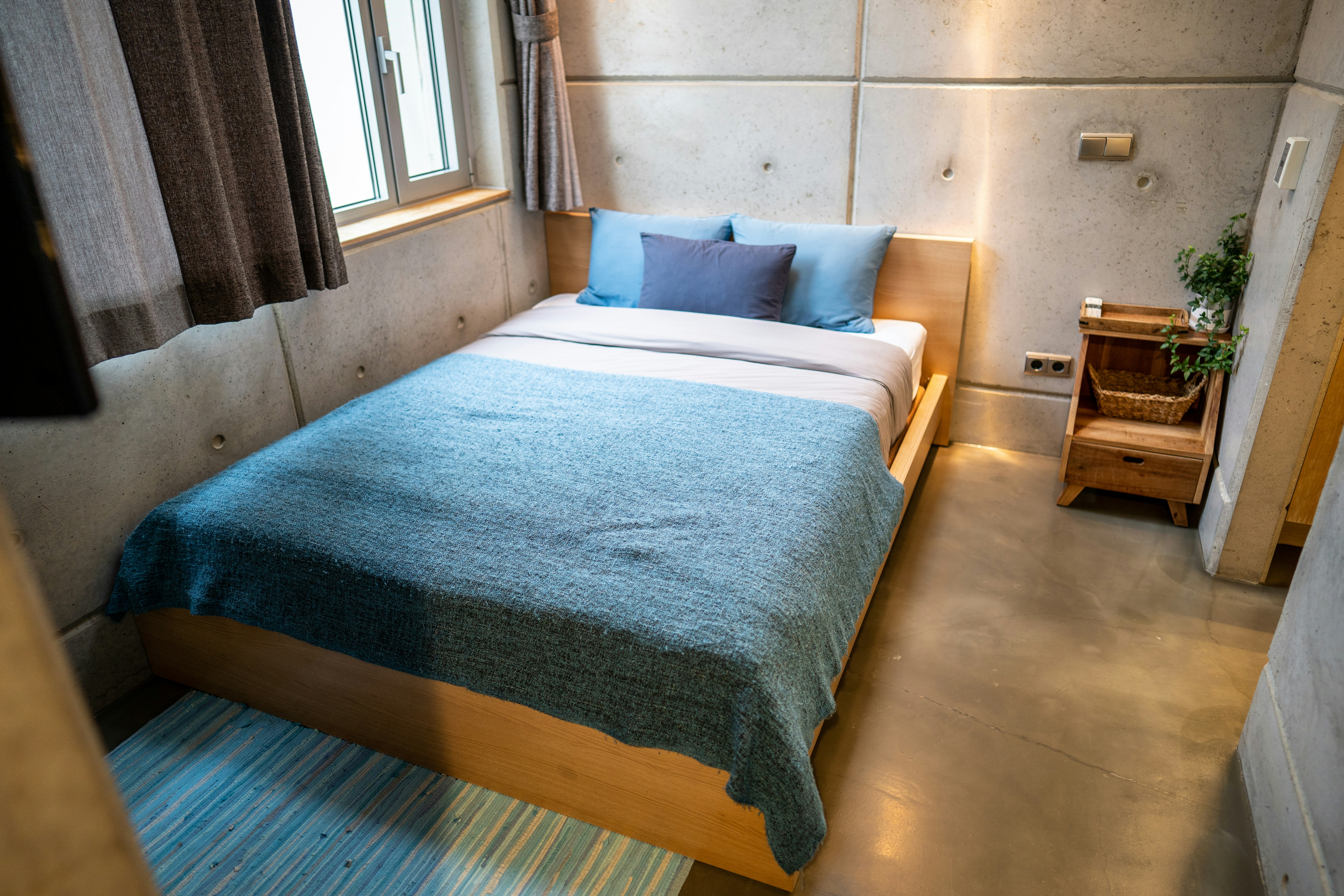 Quelques lits dans une chambre photo – Photo Lit Gratuite sur Unsplash