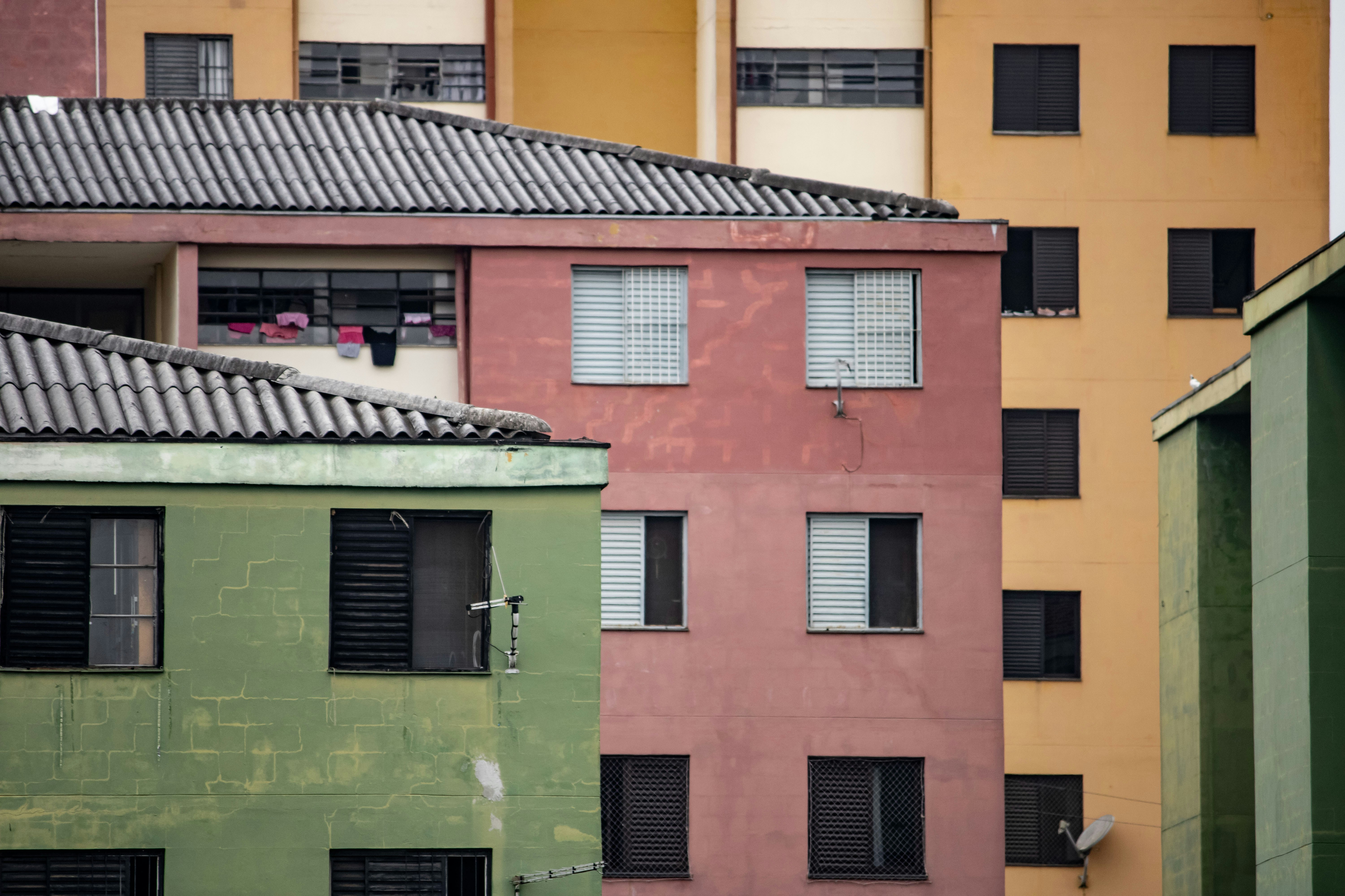 Patchwork Facade: A Quiet Street of Colorful Apartments