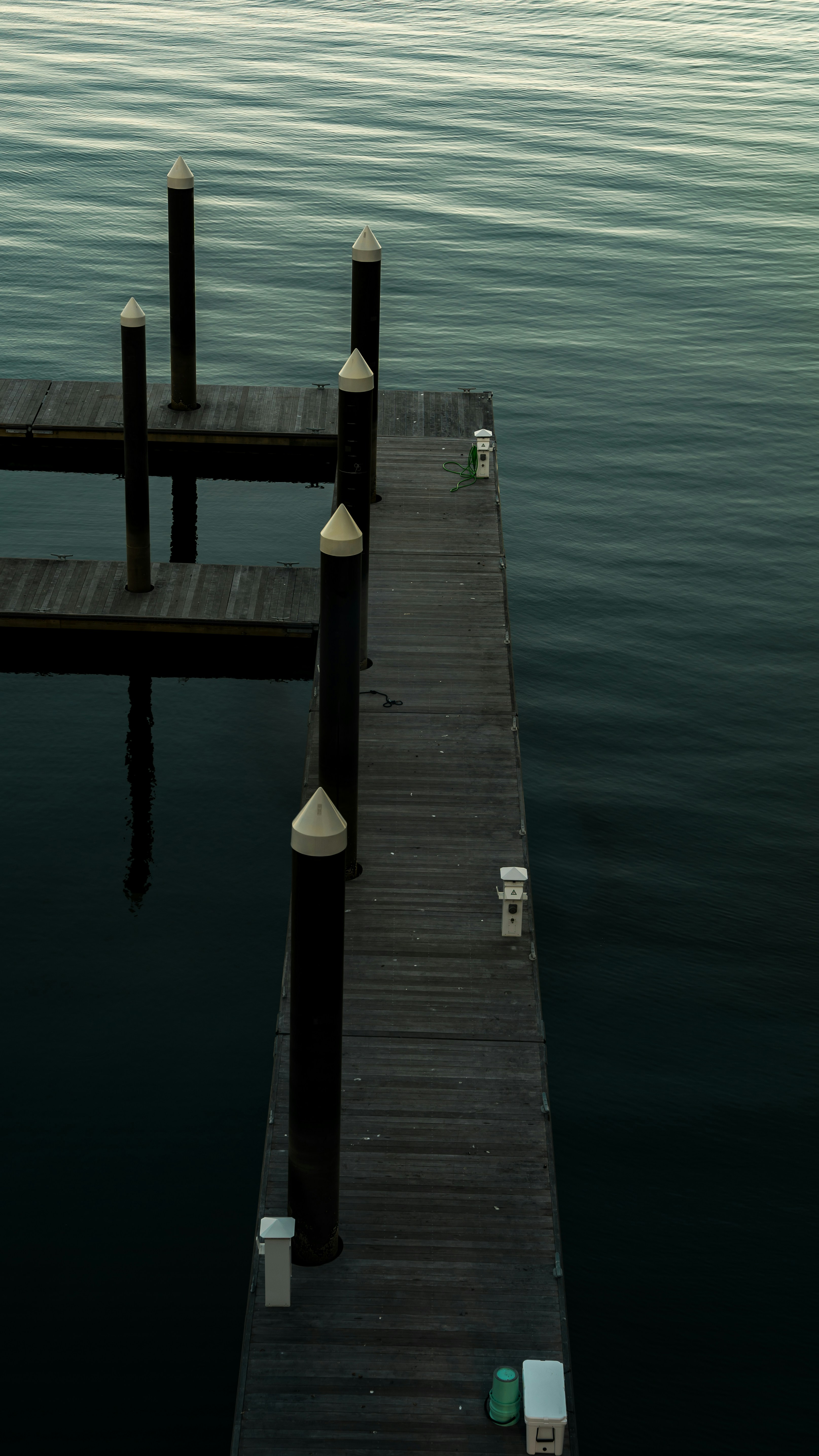 A dock with poles on it photo – Free Boston Image on Unsplash