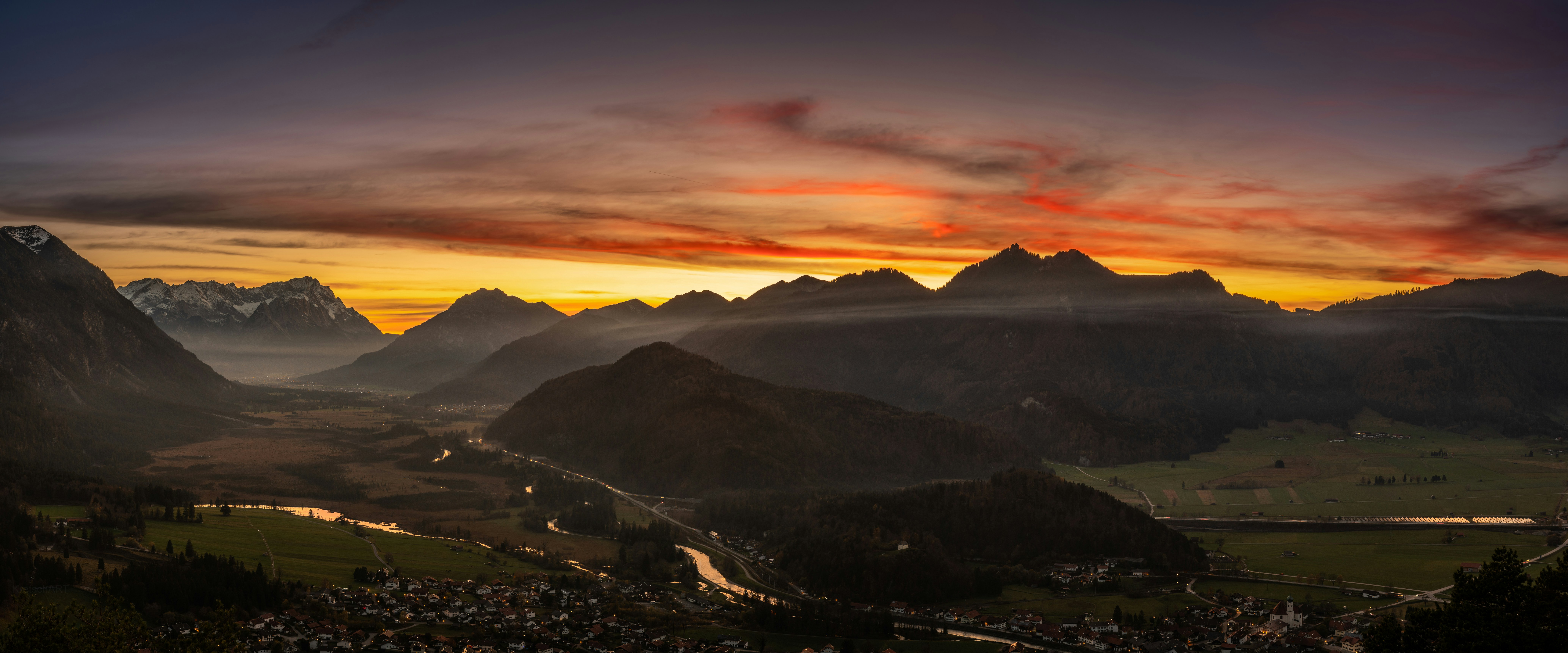 Crimson Crest at Dusk: Alpine Valley Beneath a Velvet Sky