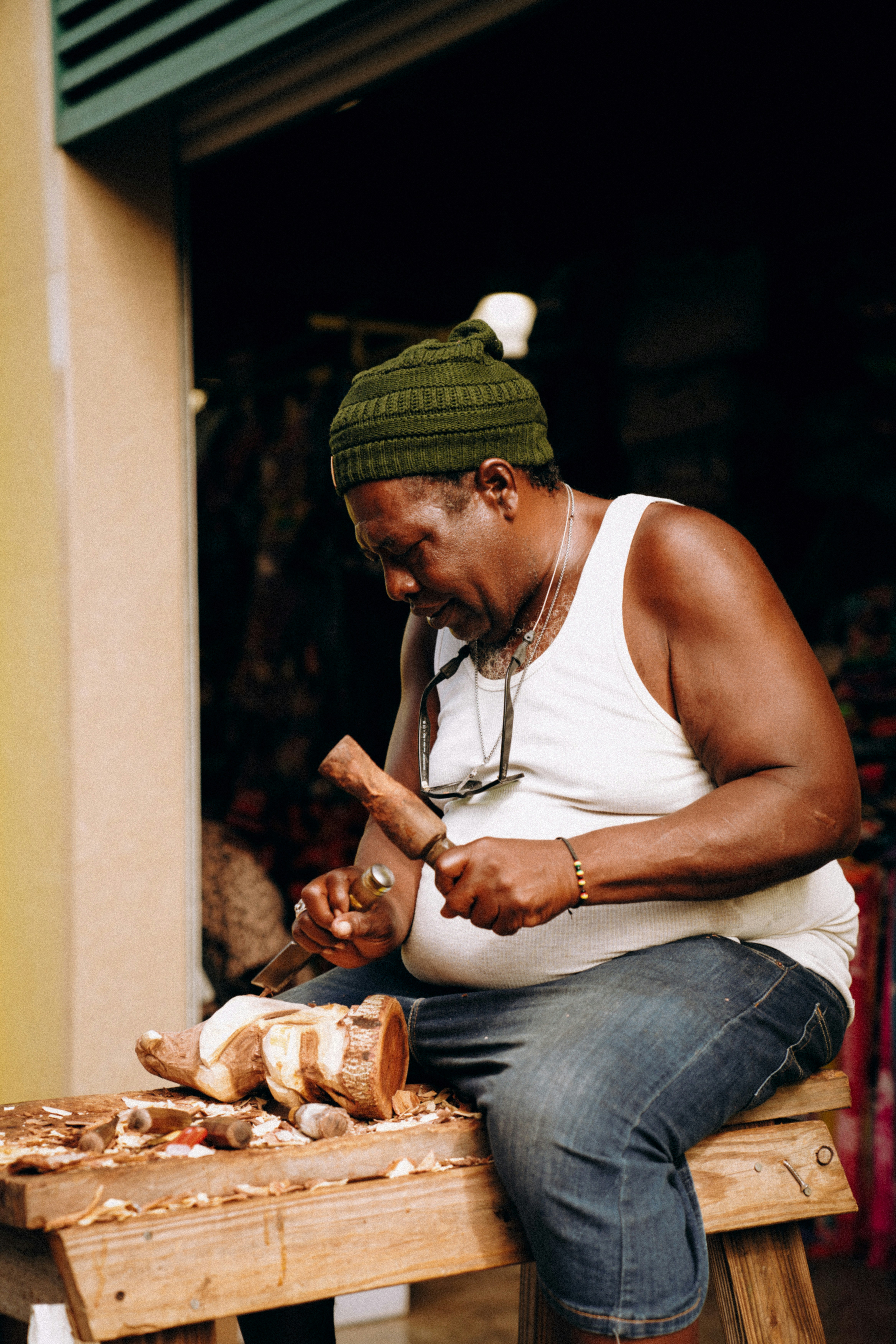 Hands at Work: A Street Woodcarver in Warm Market Light