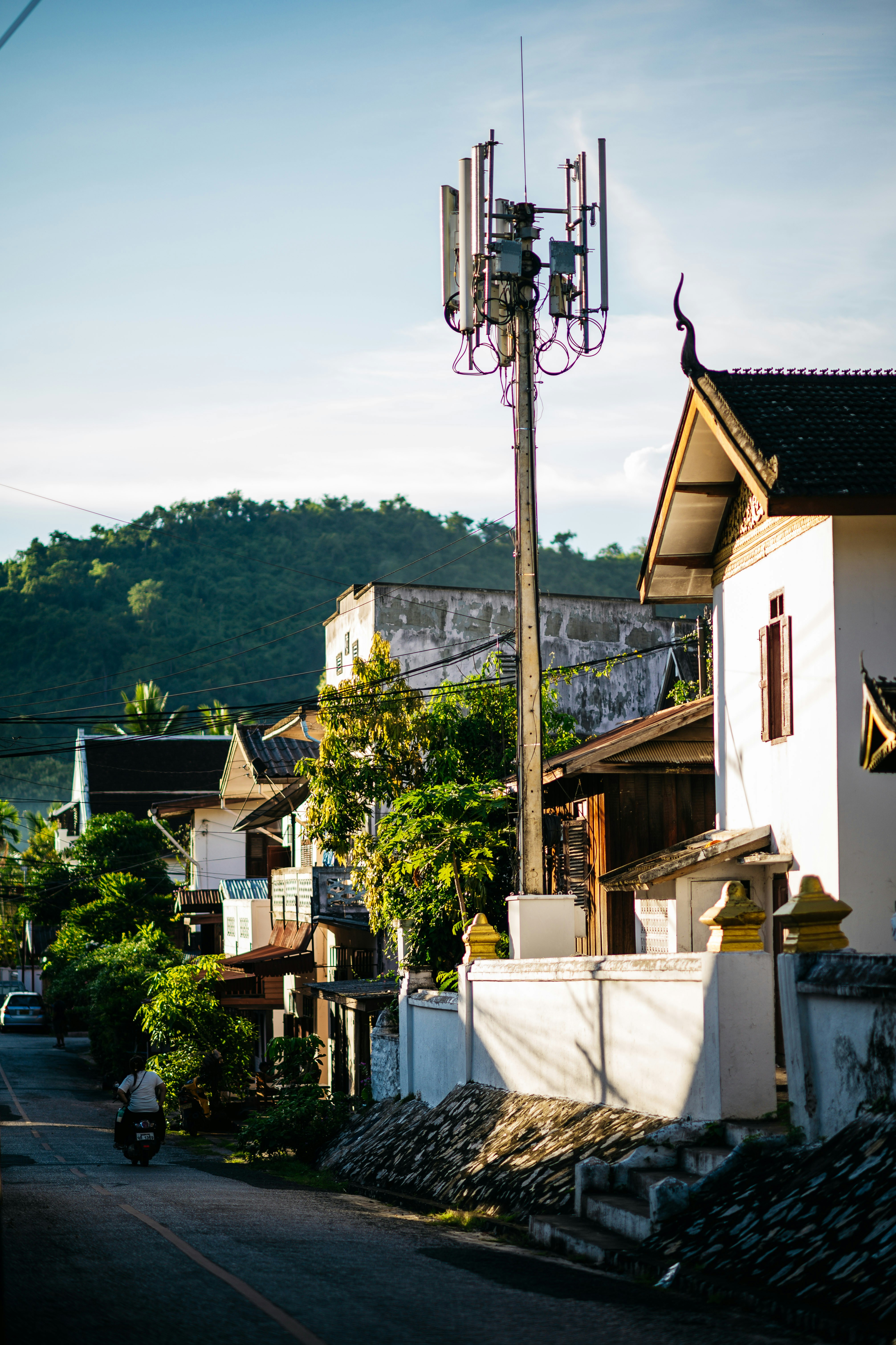 a pole with a satellite dish on it