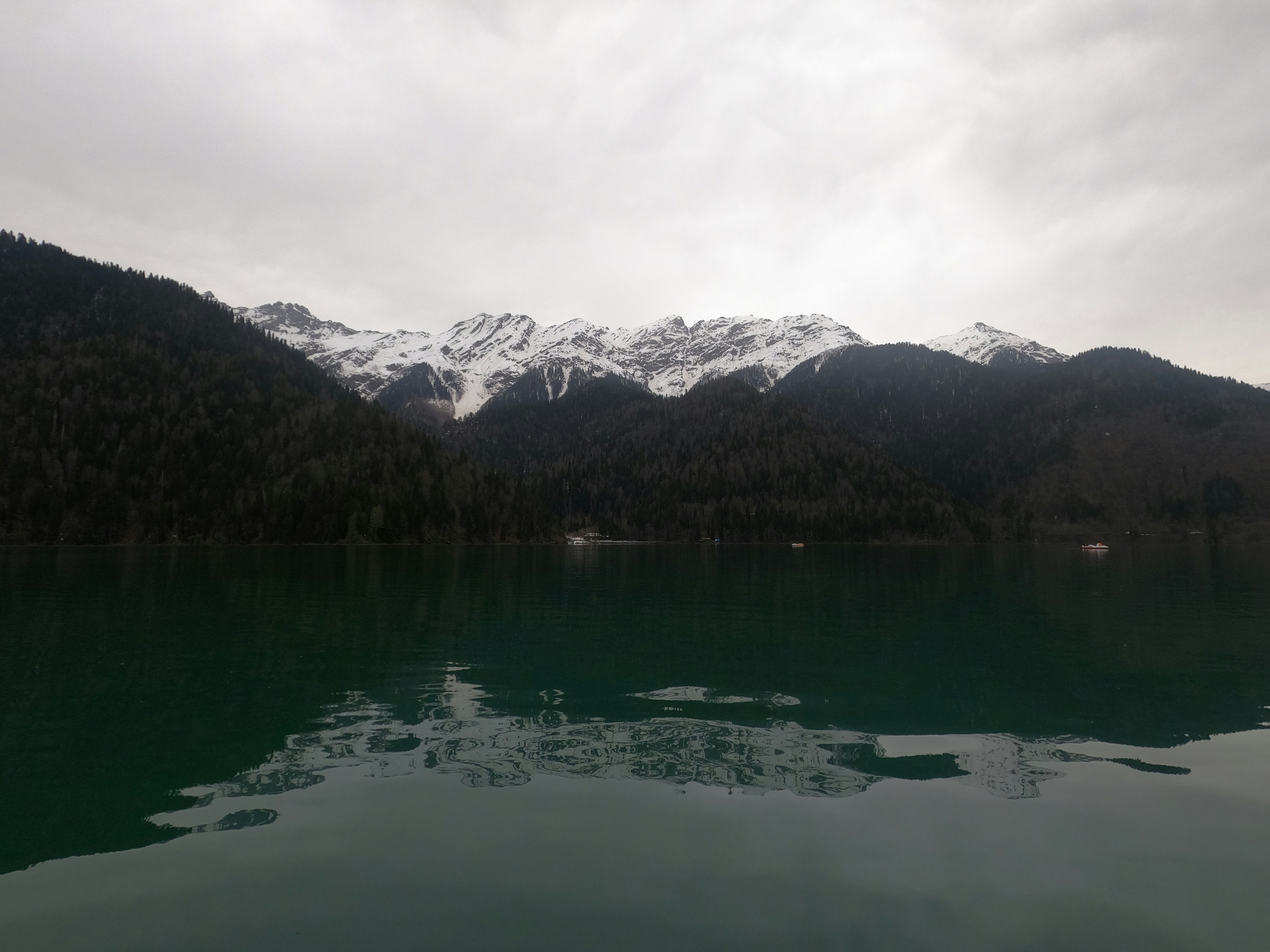 Whispered Peaks Reflect on a Glassy Alpine Lake