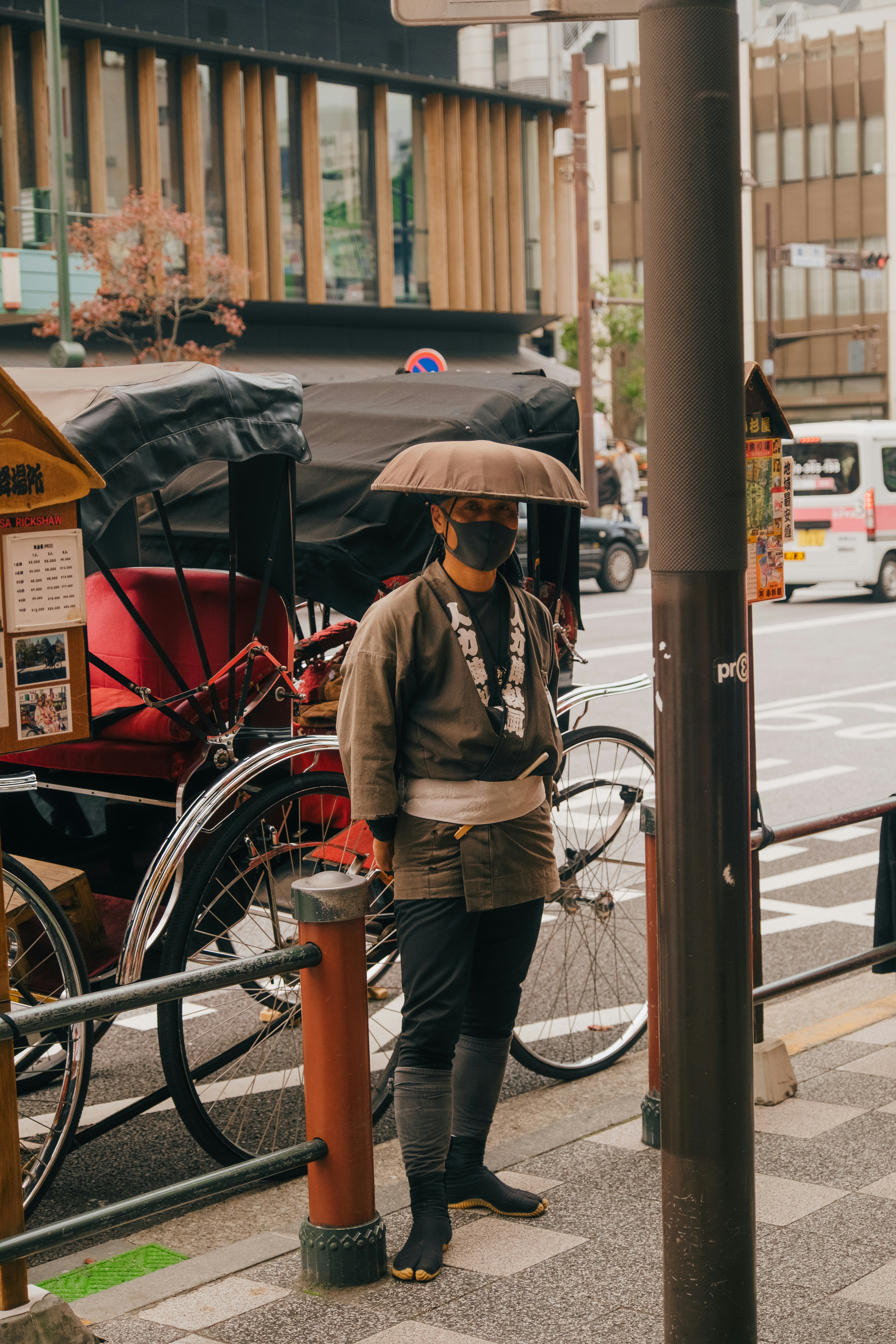 Umbrella-Clad Sentinel by the Rickshaw: Tradition Meets City Pulse