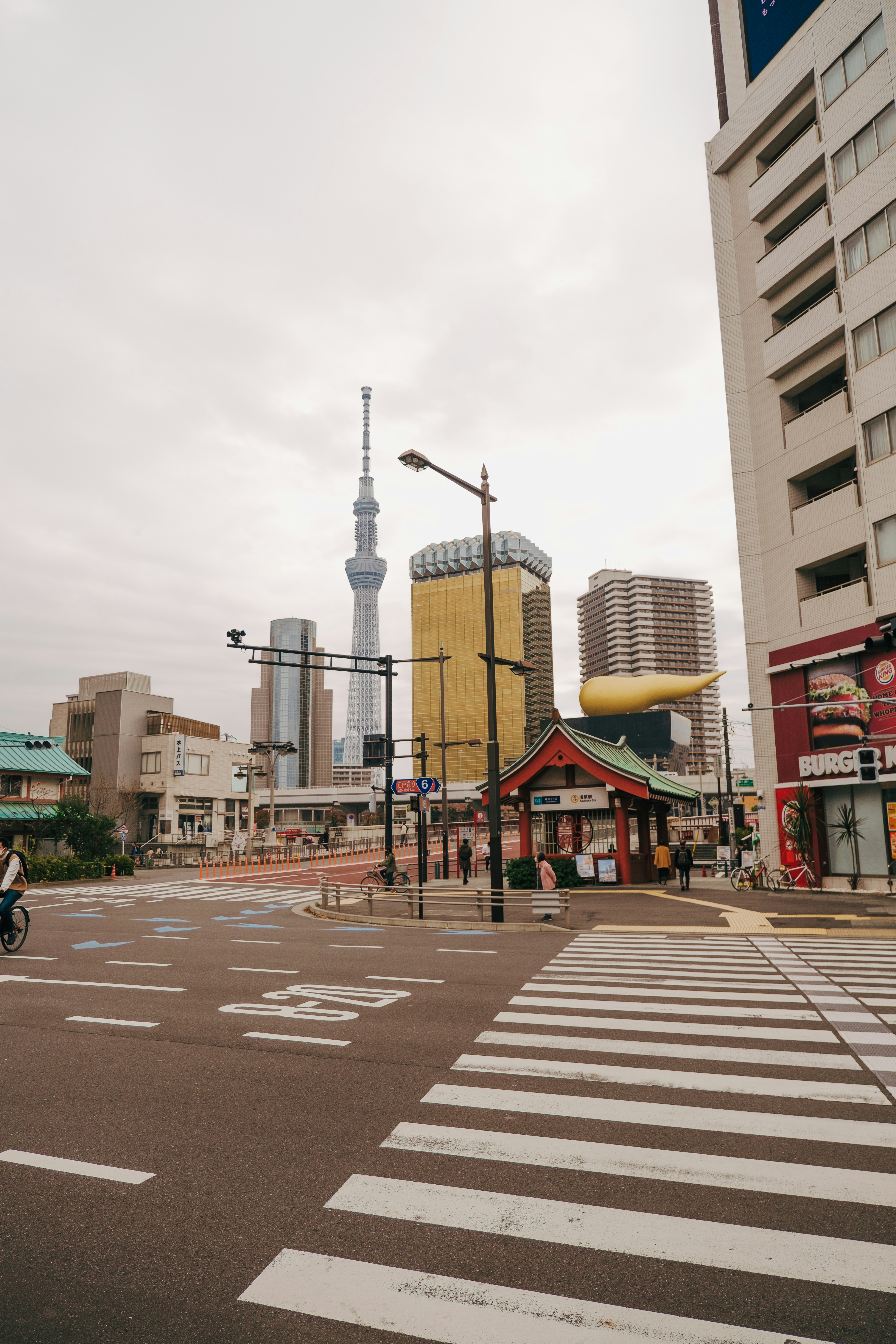 Red Gate, Silver Spire: Street Crossing Beneath Tokyo Skytree