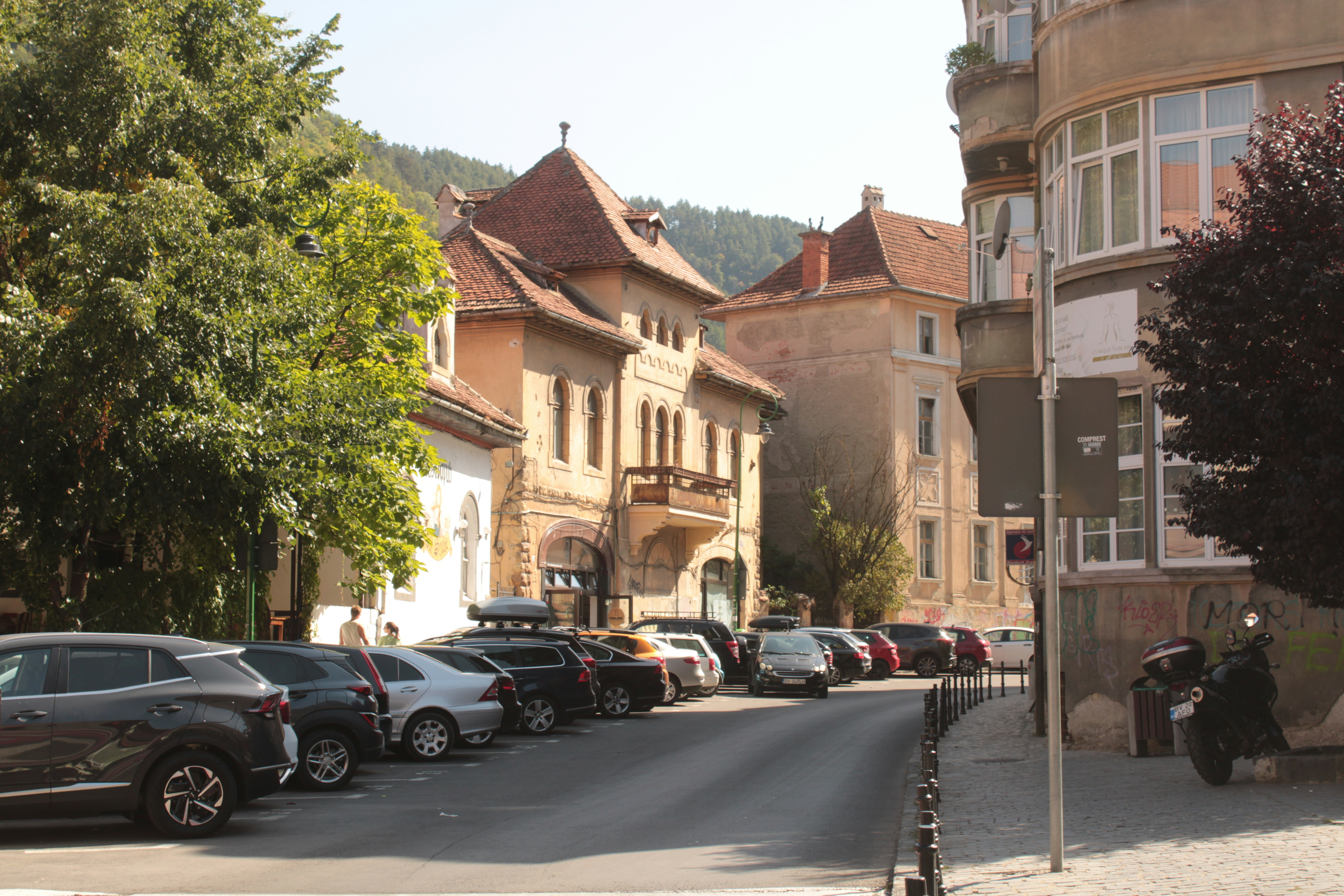 a street with cars parked along it