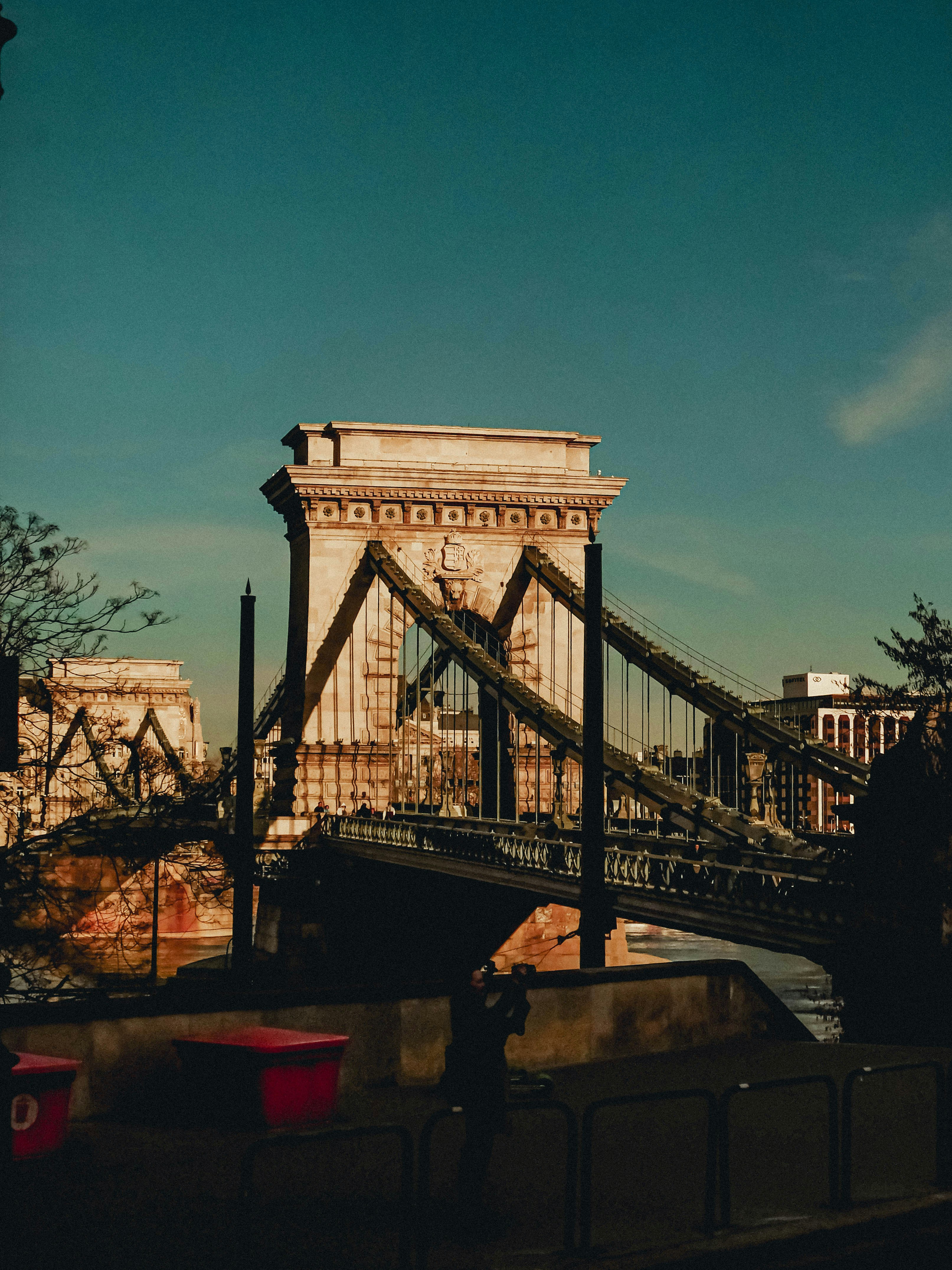 Sunlit Chain of Stone: A Morning View of the City Bridge