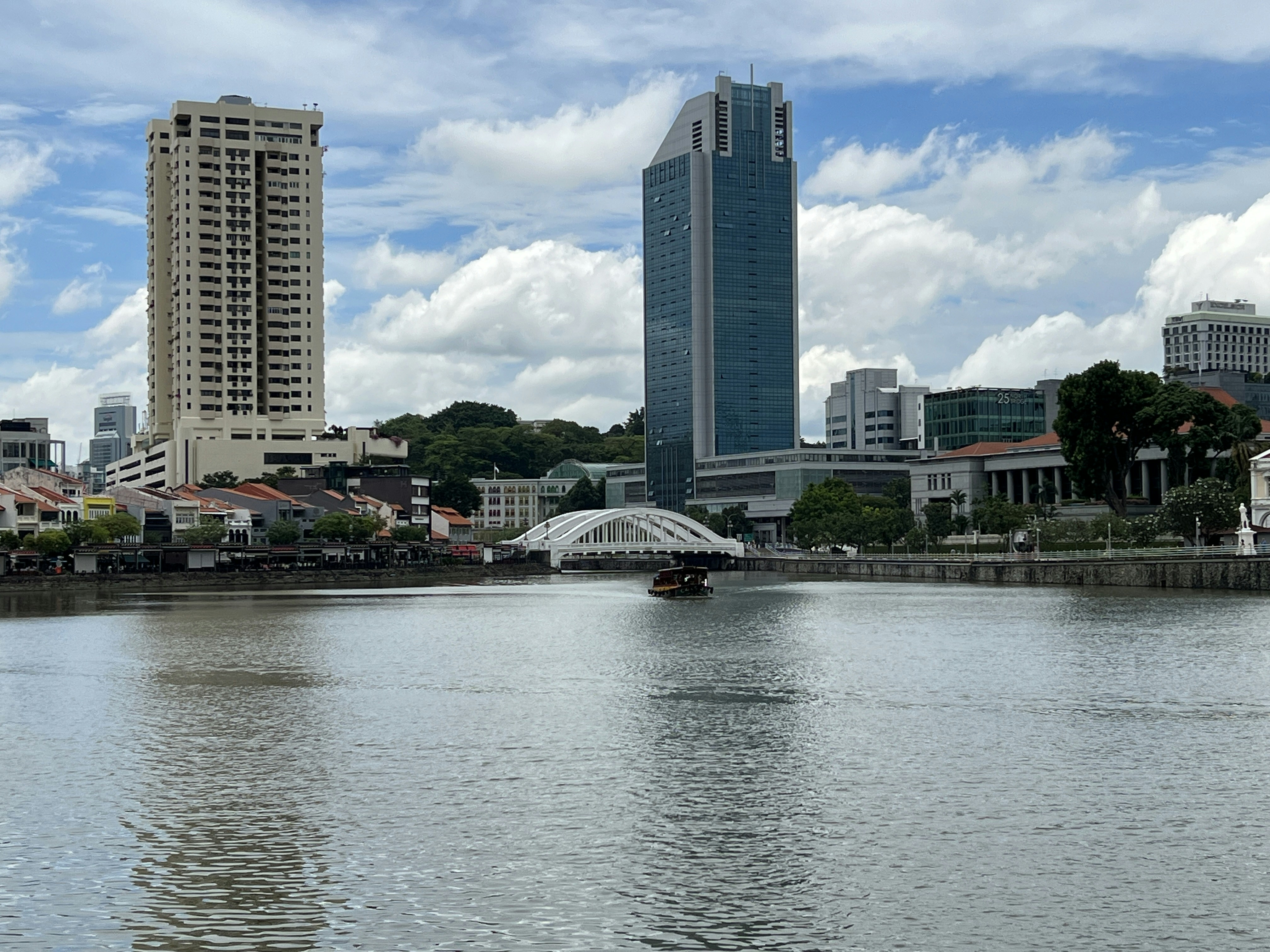 Azure Tower and the White Arch: A Cityfront Skyline Over the Quiet River
