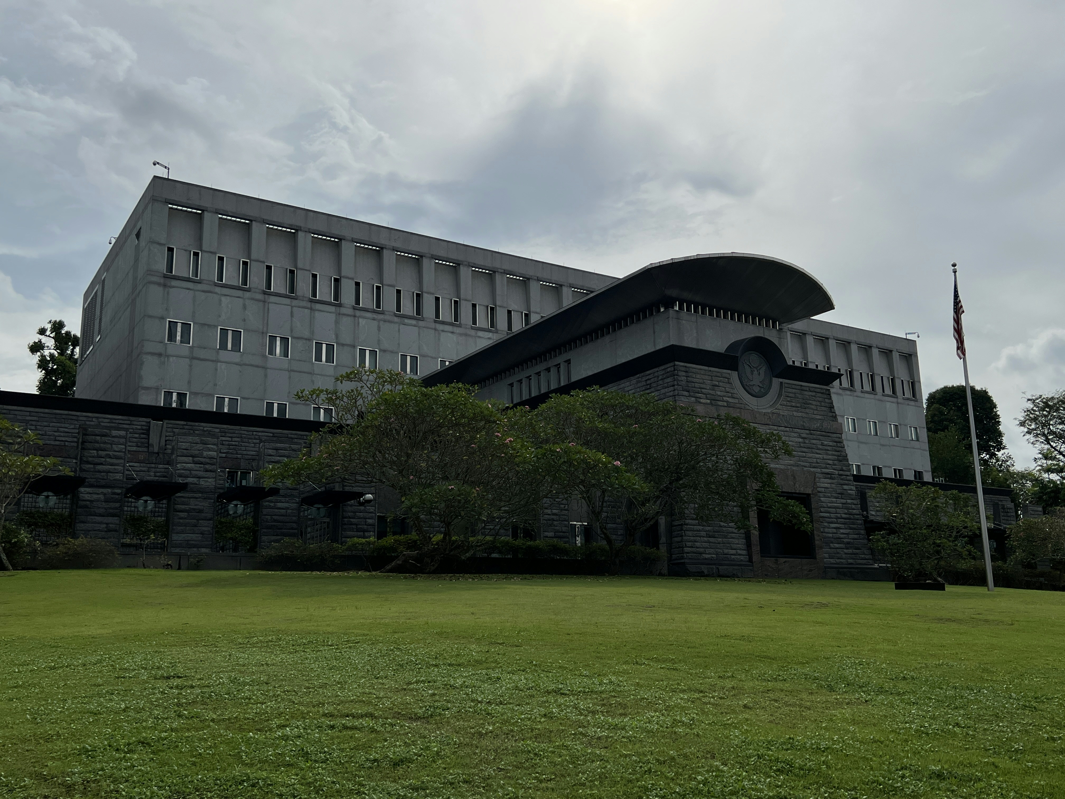 a building with a grass lawn