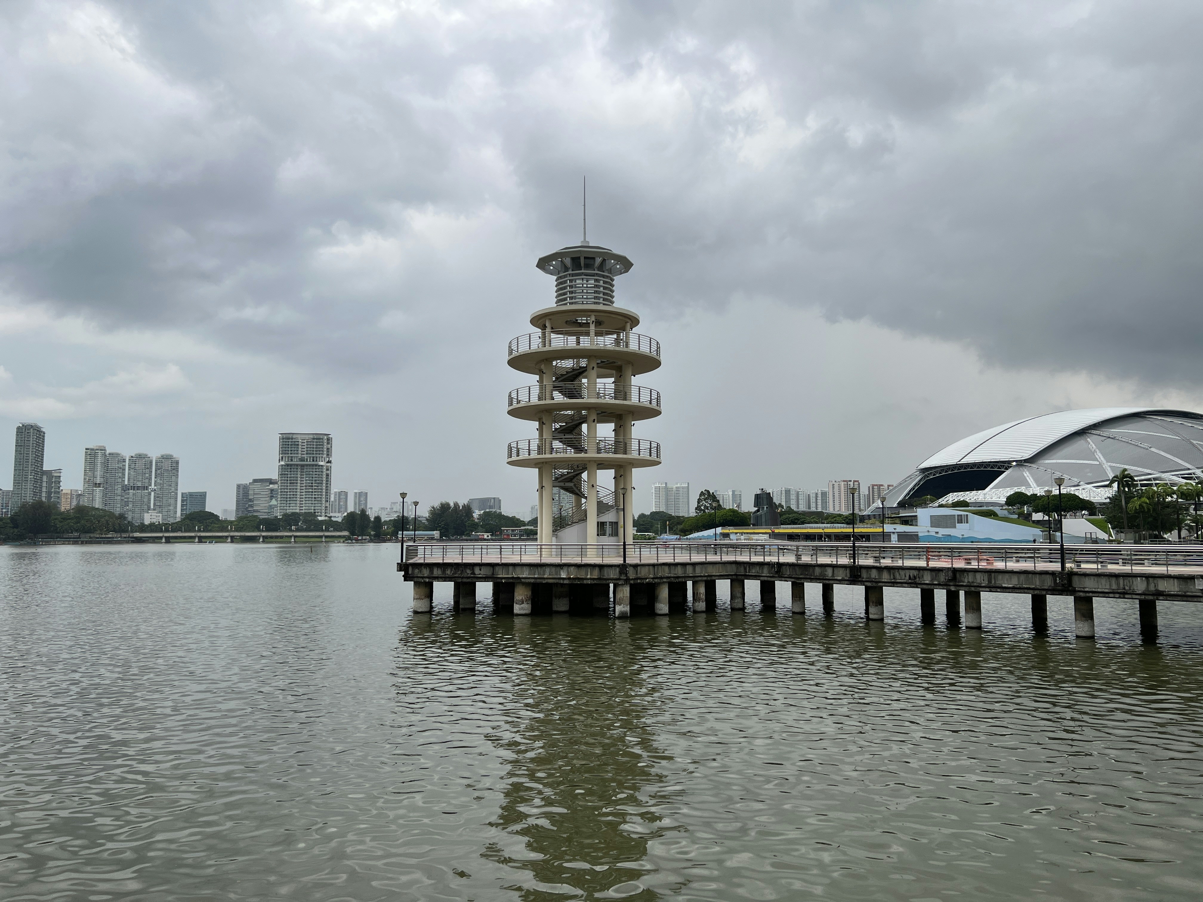 Towering Rings Over The Lake: A Promenade's Concrete Spiral