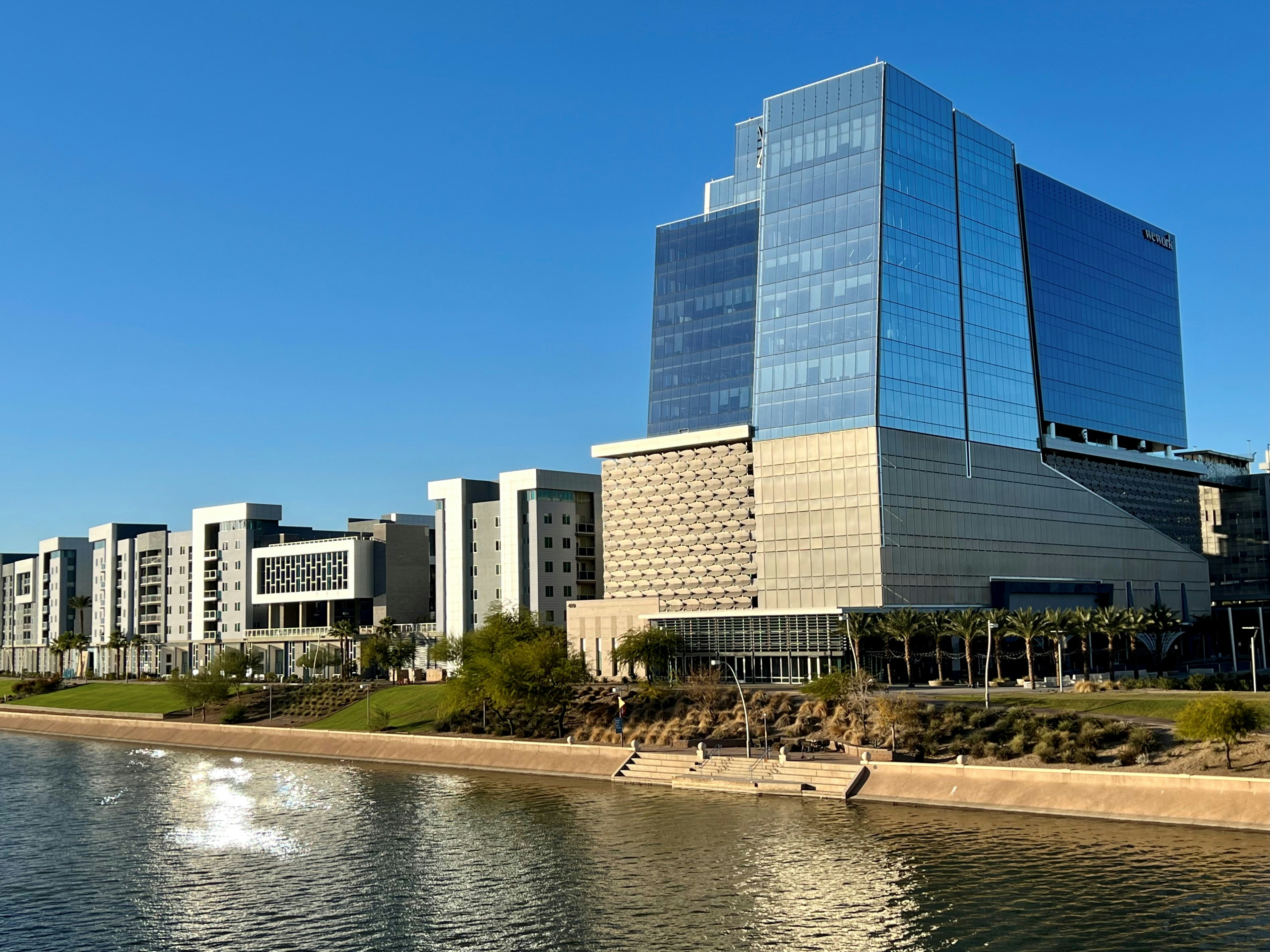 A large building next to a body of water photo – Free Tempe town lake ...
