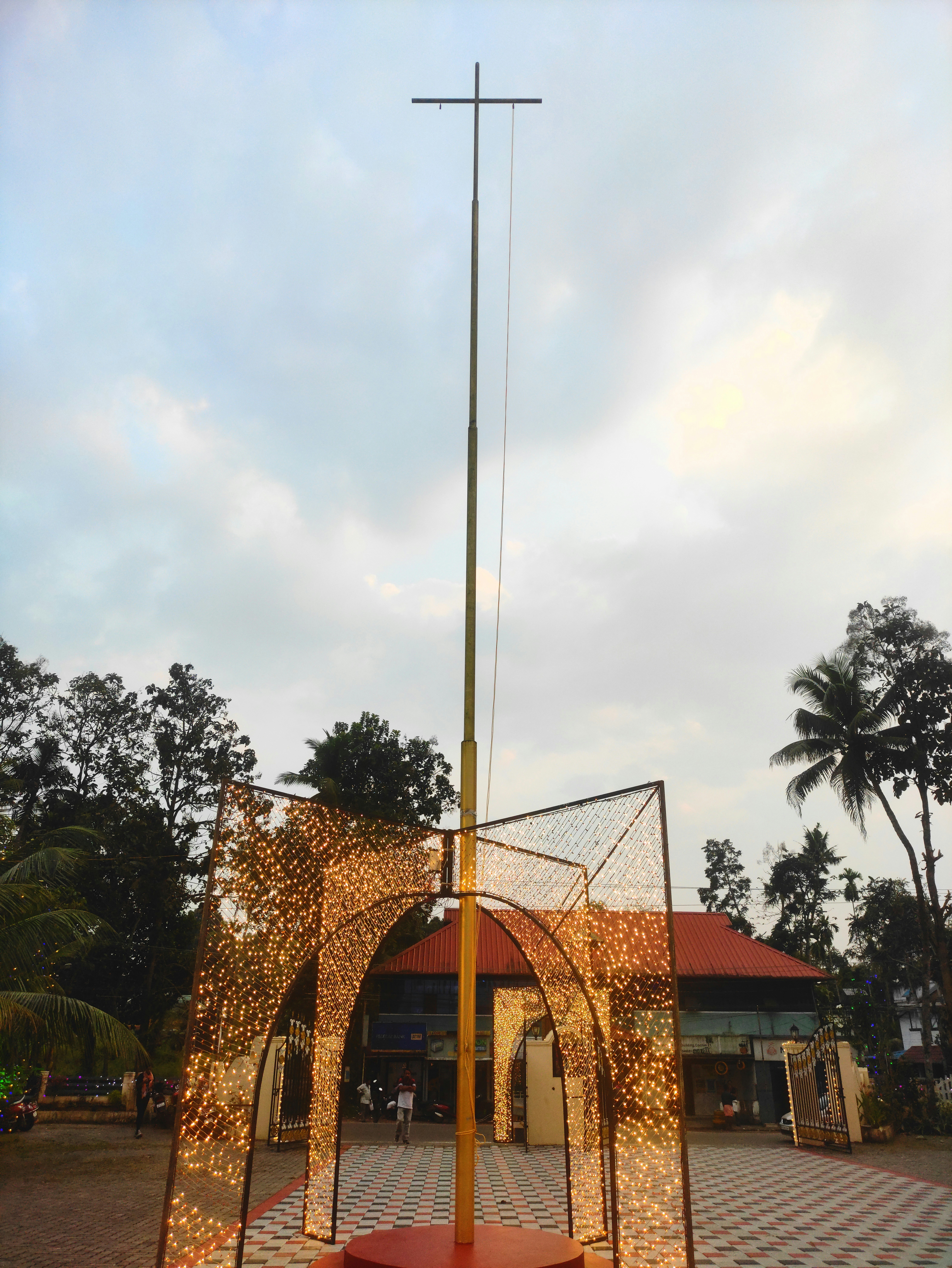 A tall pole with a cross on top of it photo – Free Image on Unsplash
