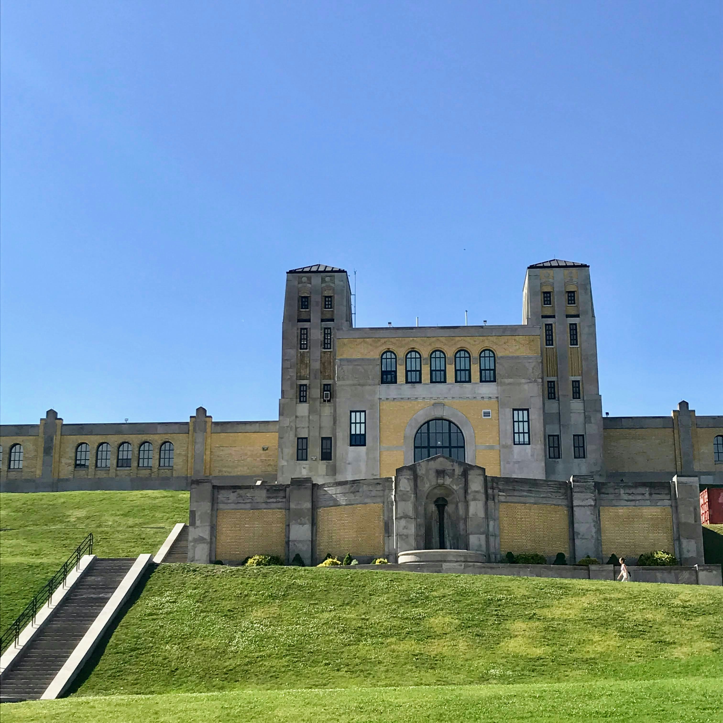 Hilltop Fortress: The Central Arch Framed by Steps and Sky