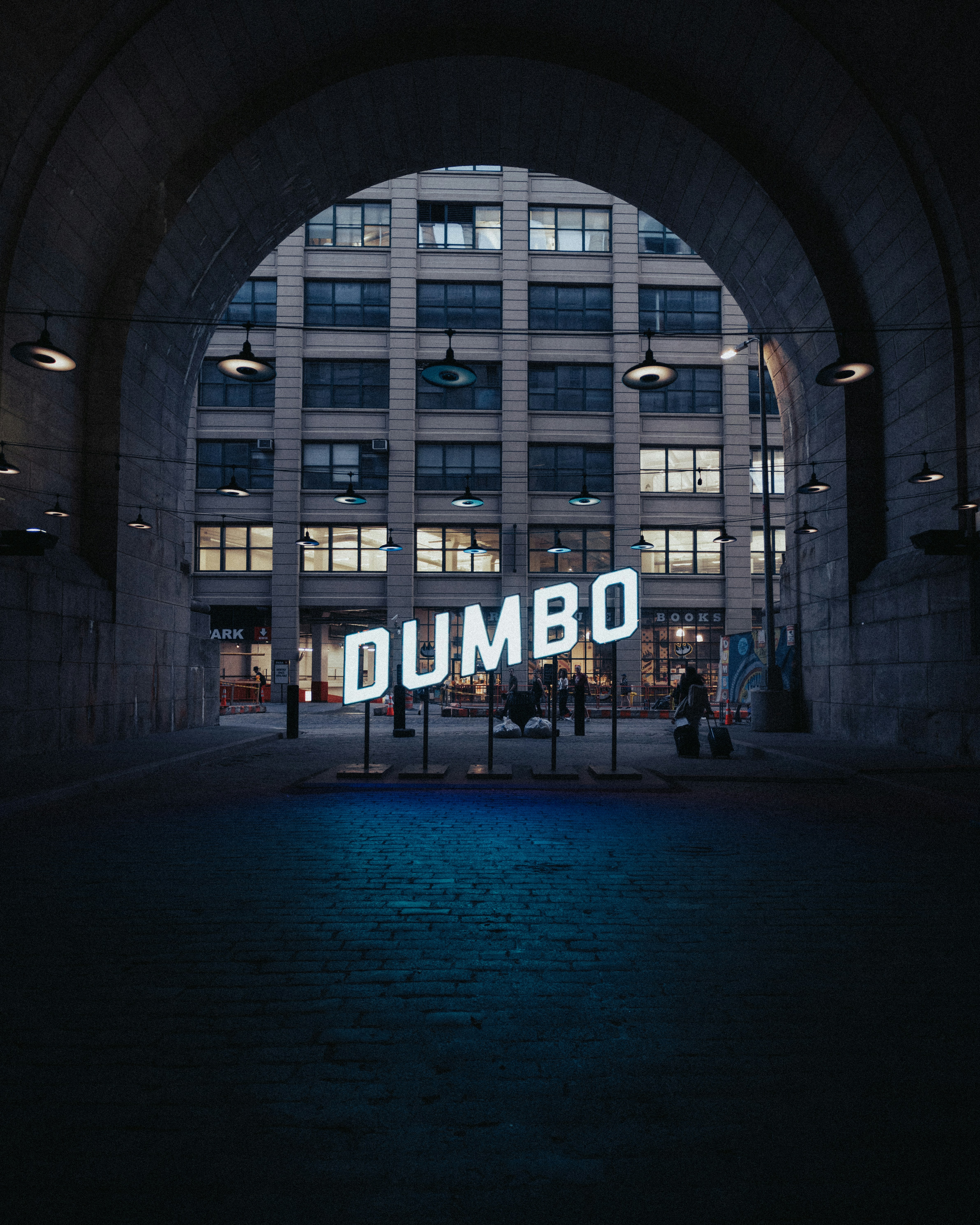 A large building with a pool in front of it photo – Free Dumbo Image on ...