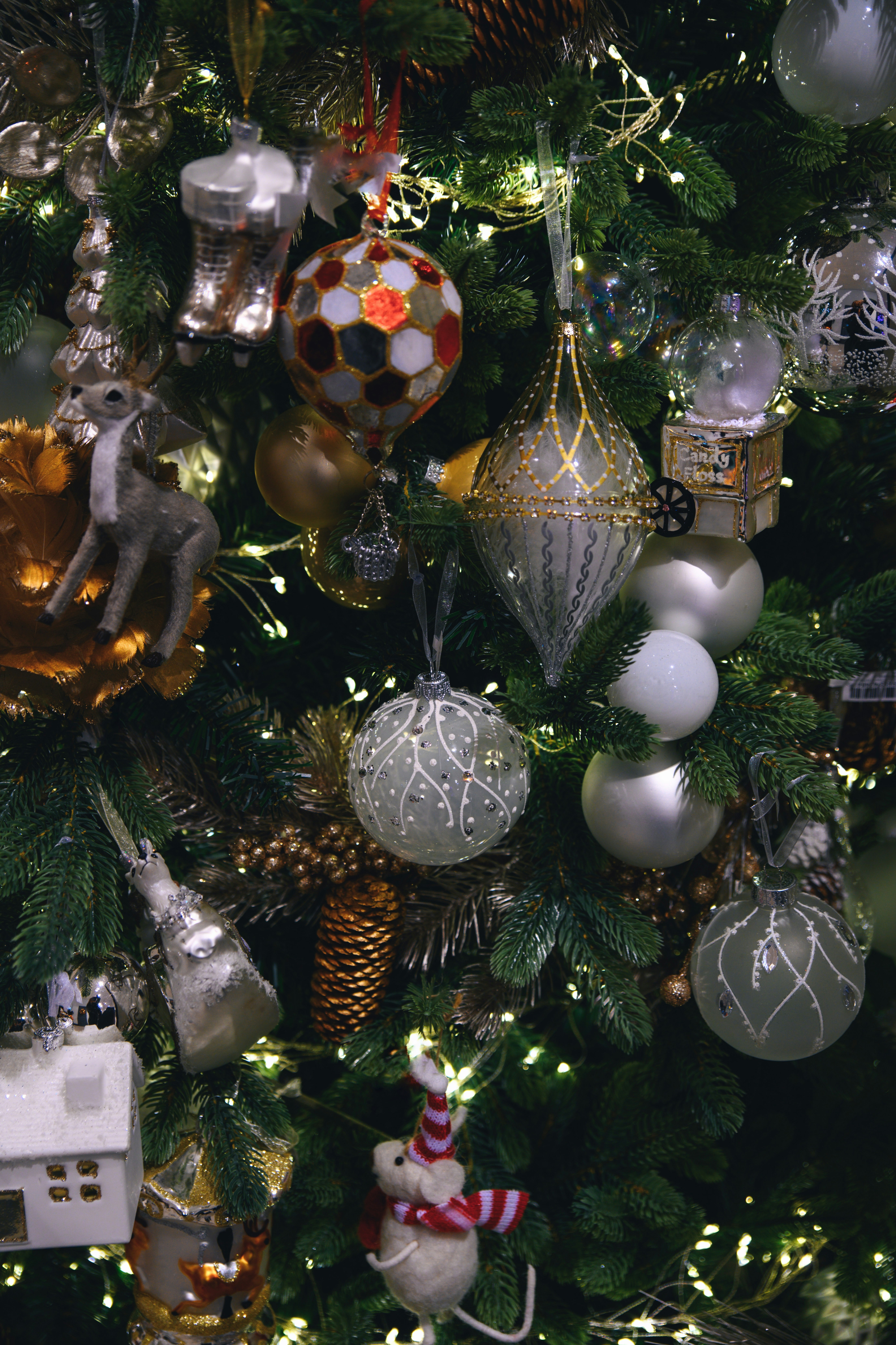 a christmas tree with ornaments and lights