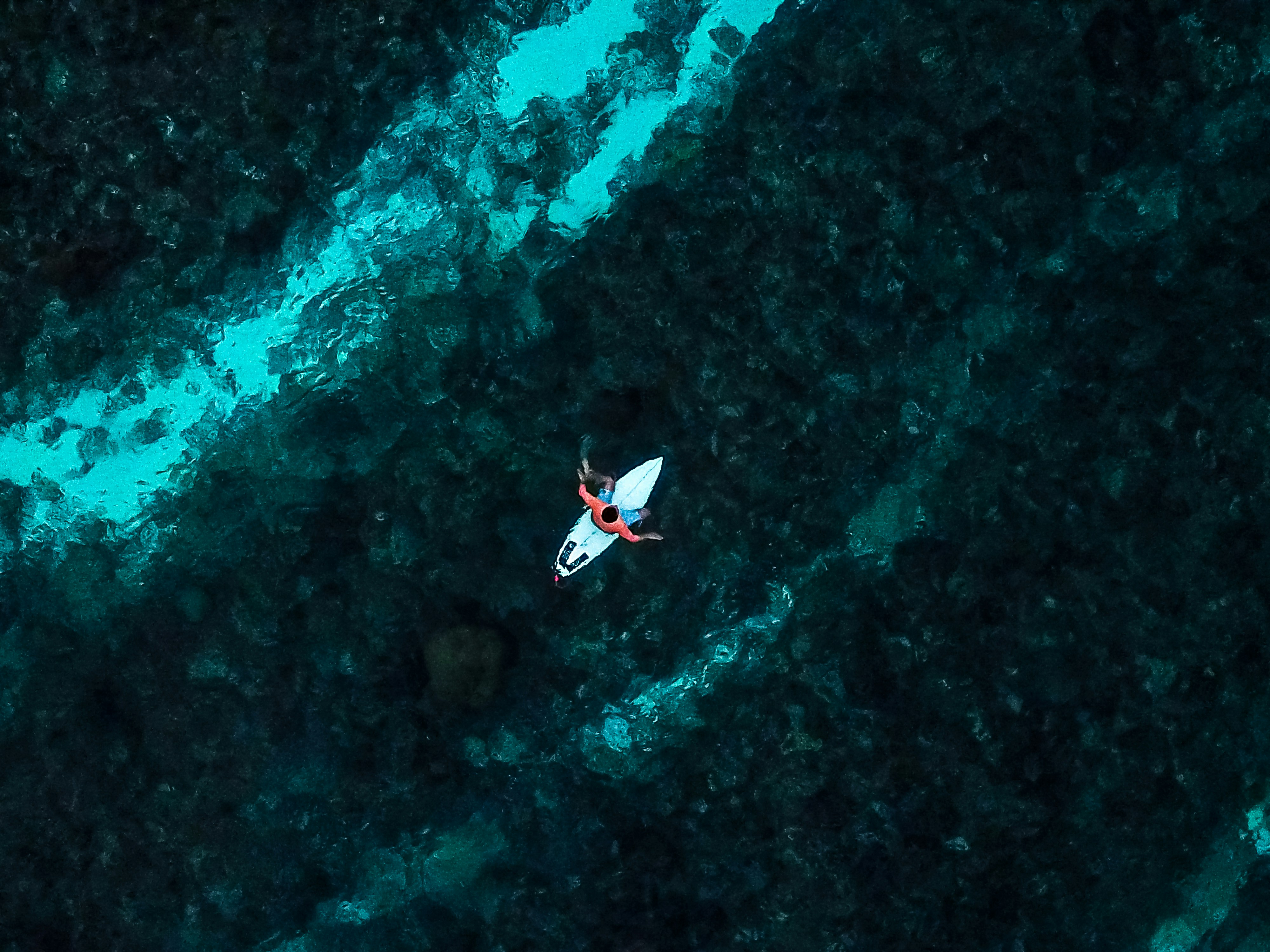 Floating off the grid in the Coral Sea, Papua New Guinea. Drone Pilot: Jeff Perez