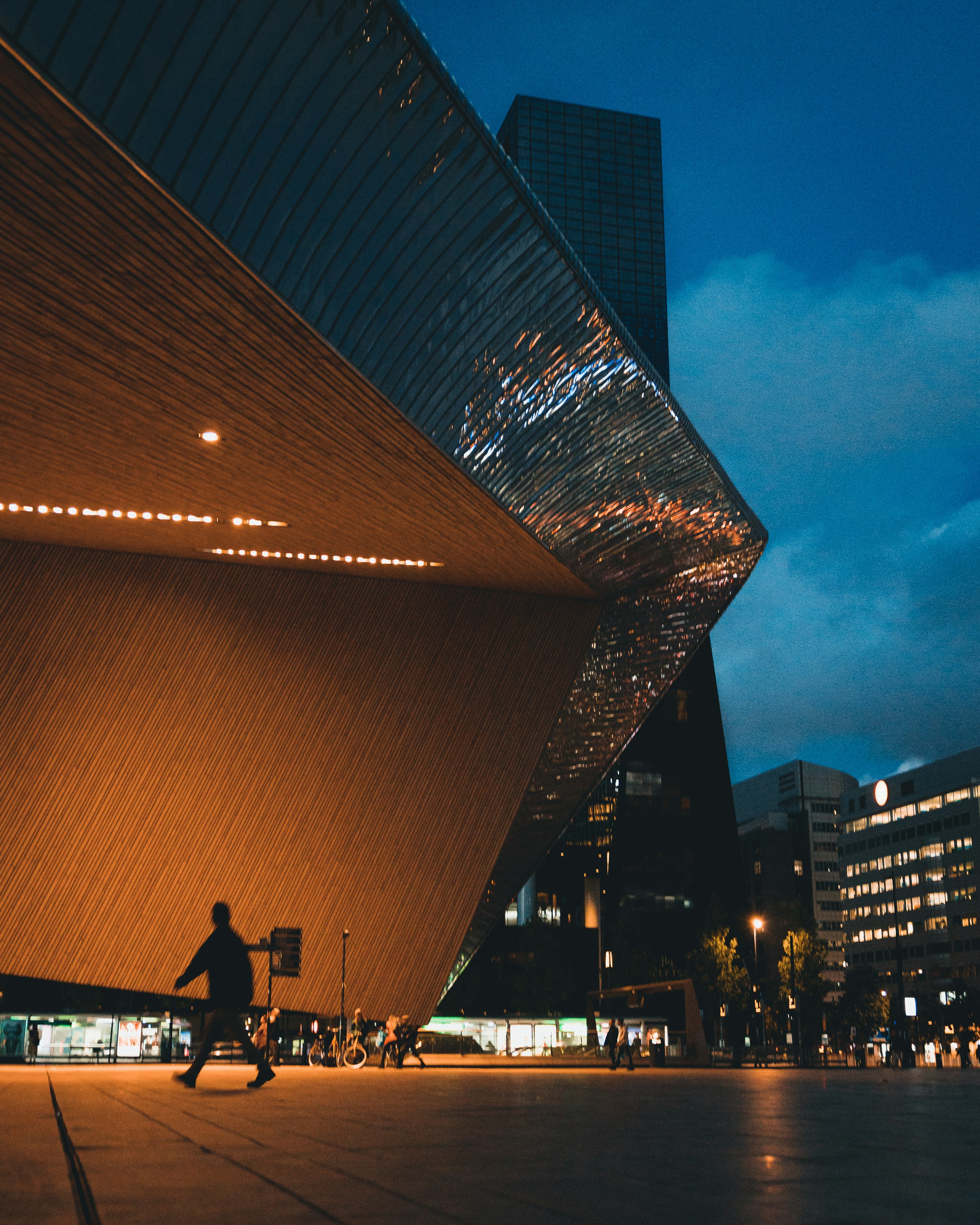 A large building with a glass front photo – Free Rotterdam Image on ...