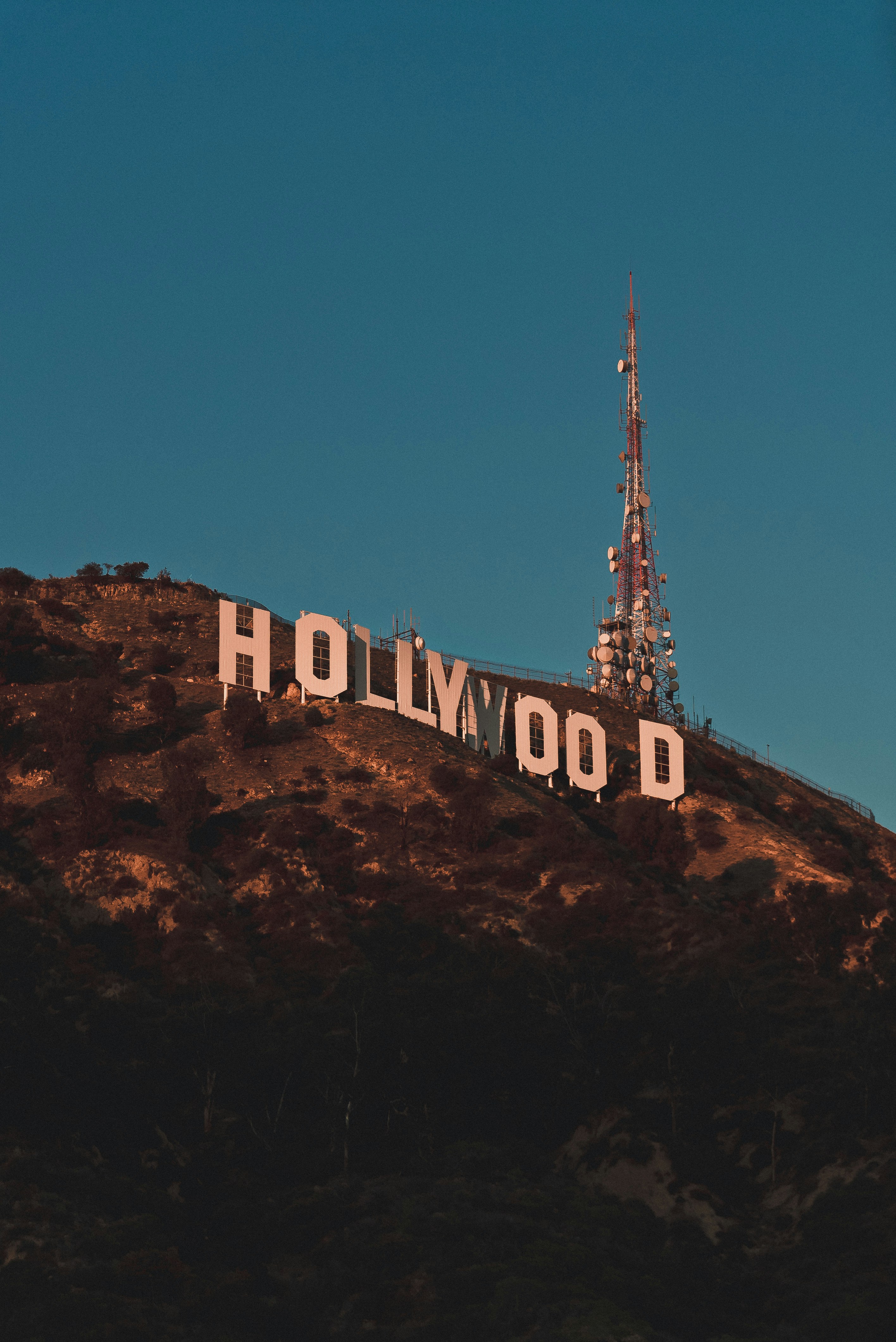 a large tower with a sign on it