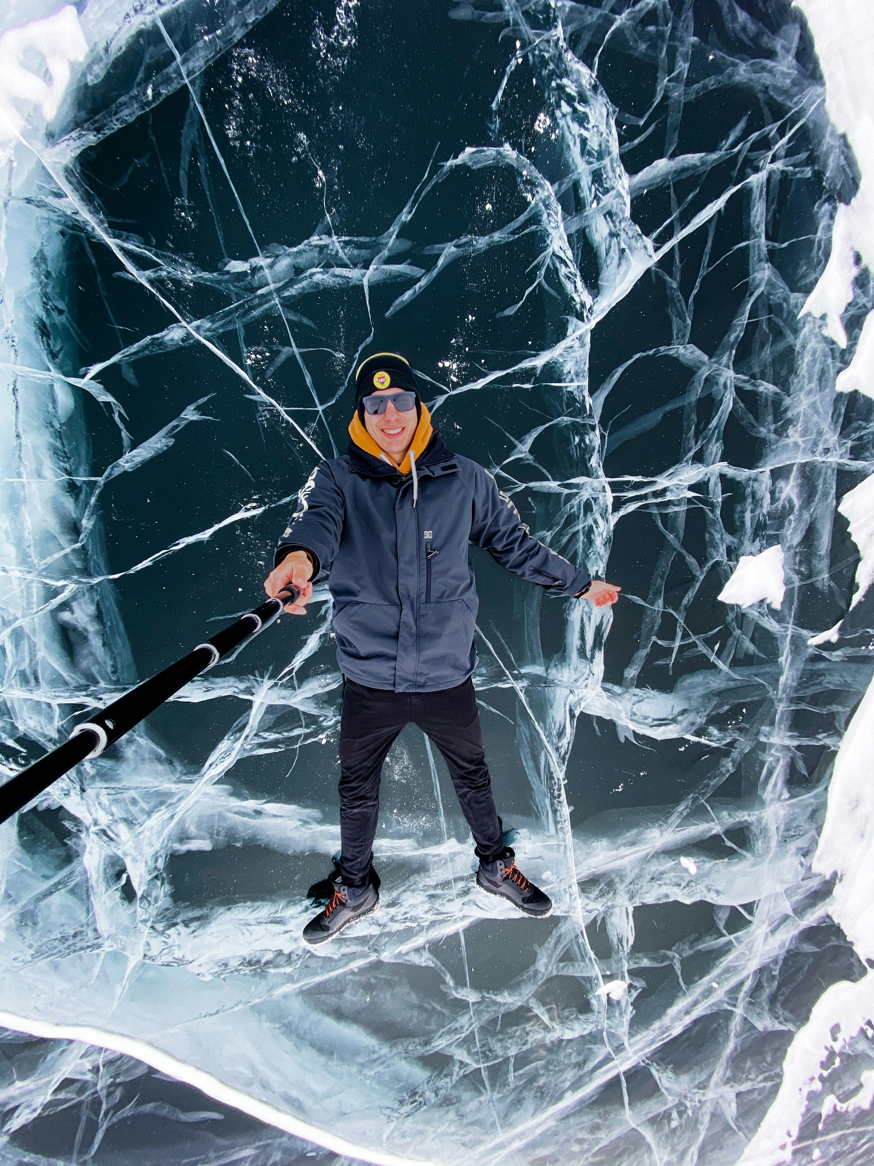Fractured Blue Ice Cathedral: A Solo Explorer's Selfie
