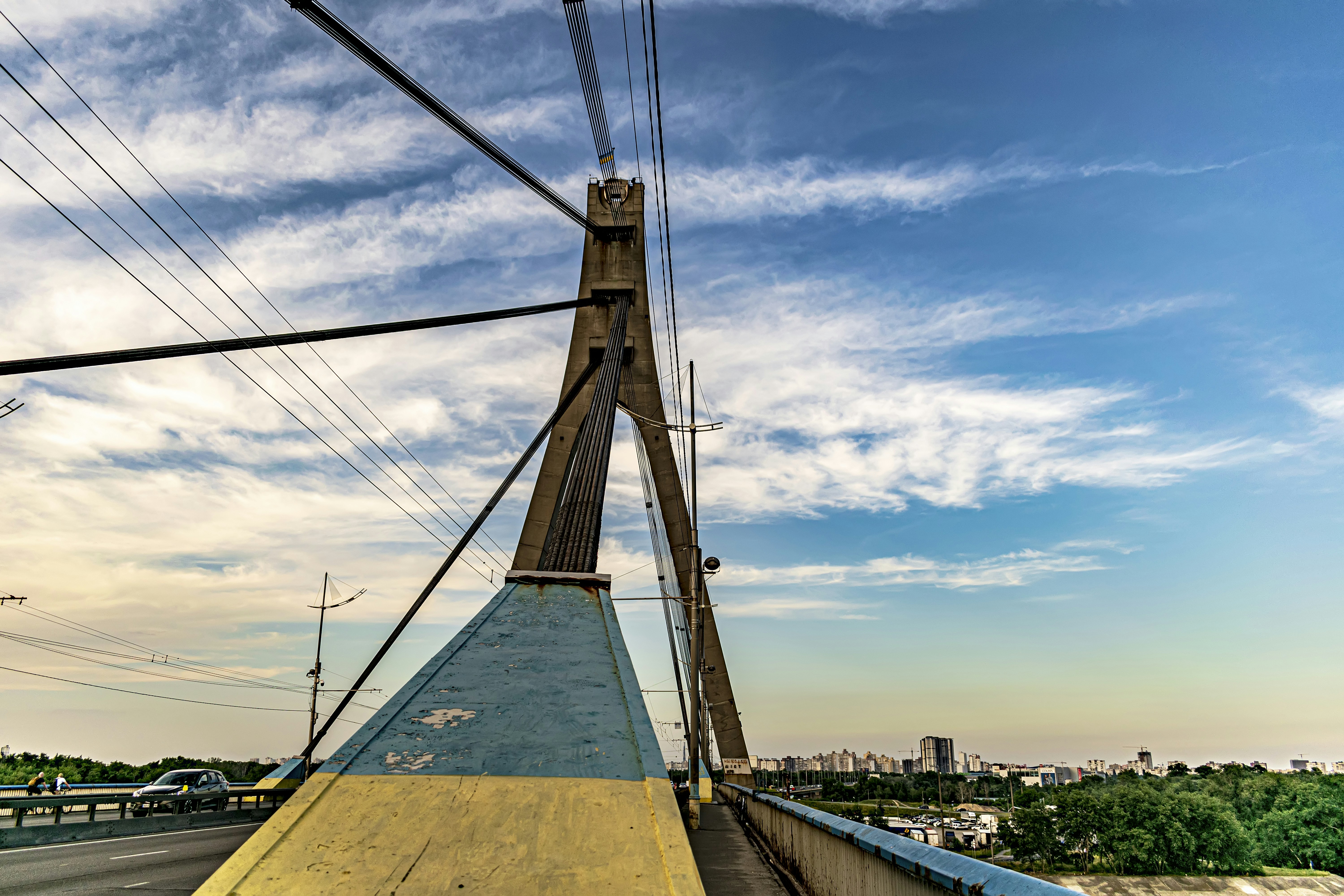 Yellow Stripe, Blue Rails, and Cables: Perspective toward the City Horizon