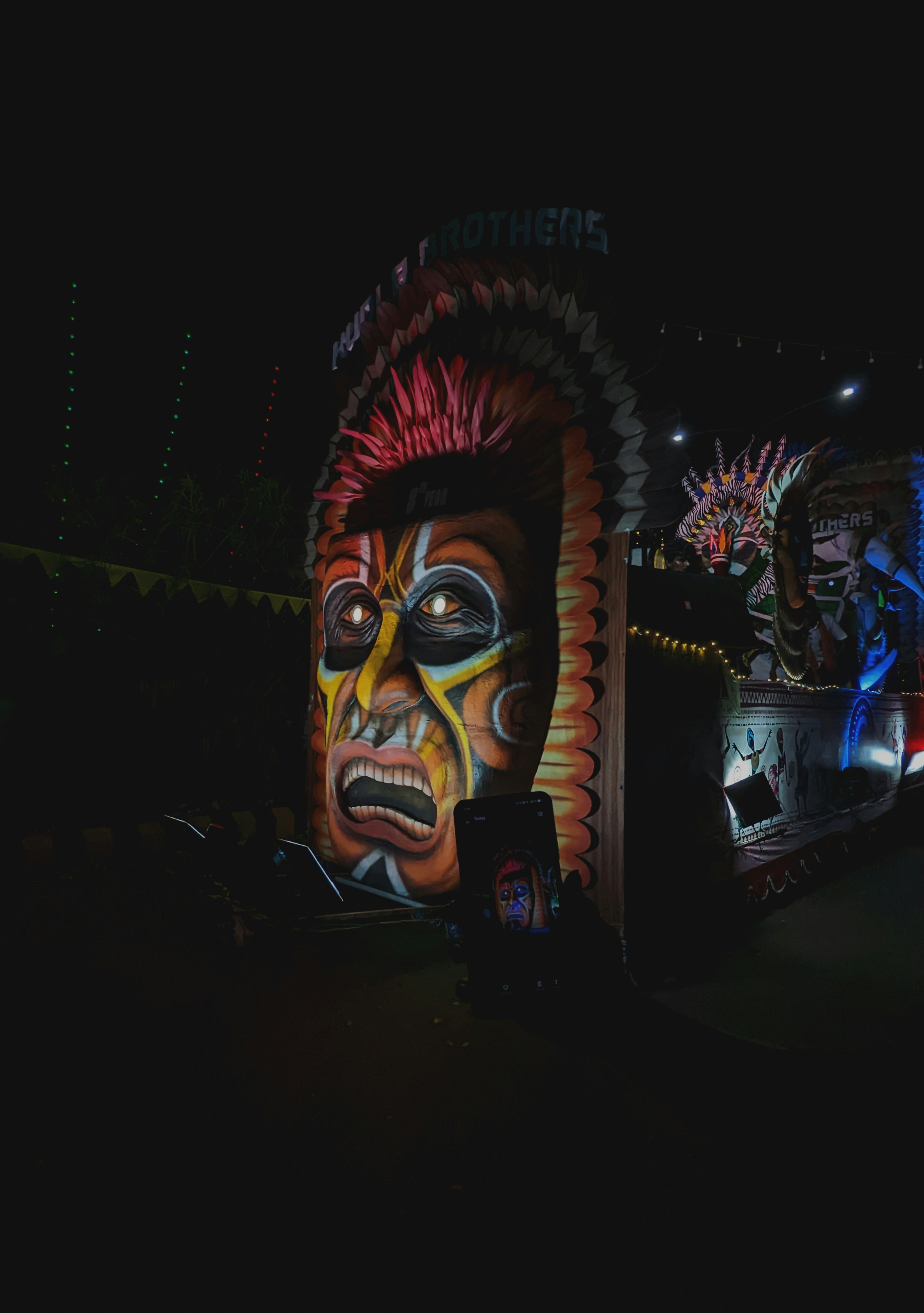 Midnight Parade: Neon Mask on a Moving Carnival Float