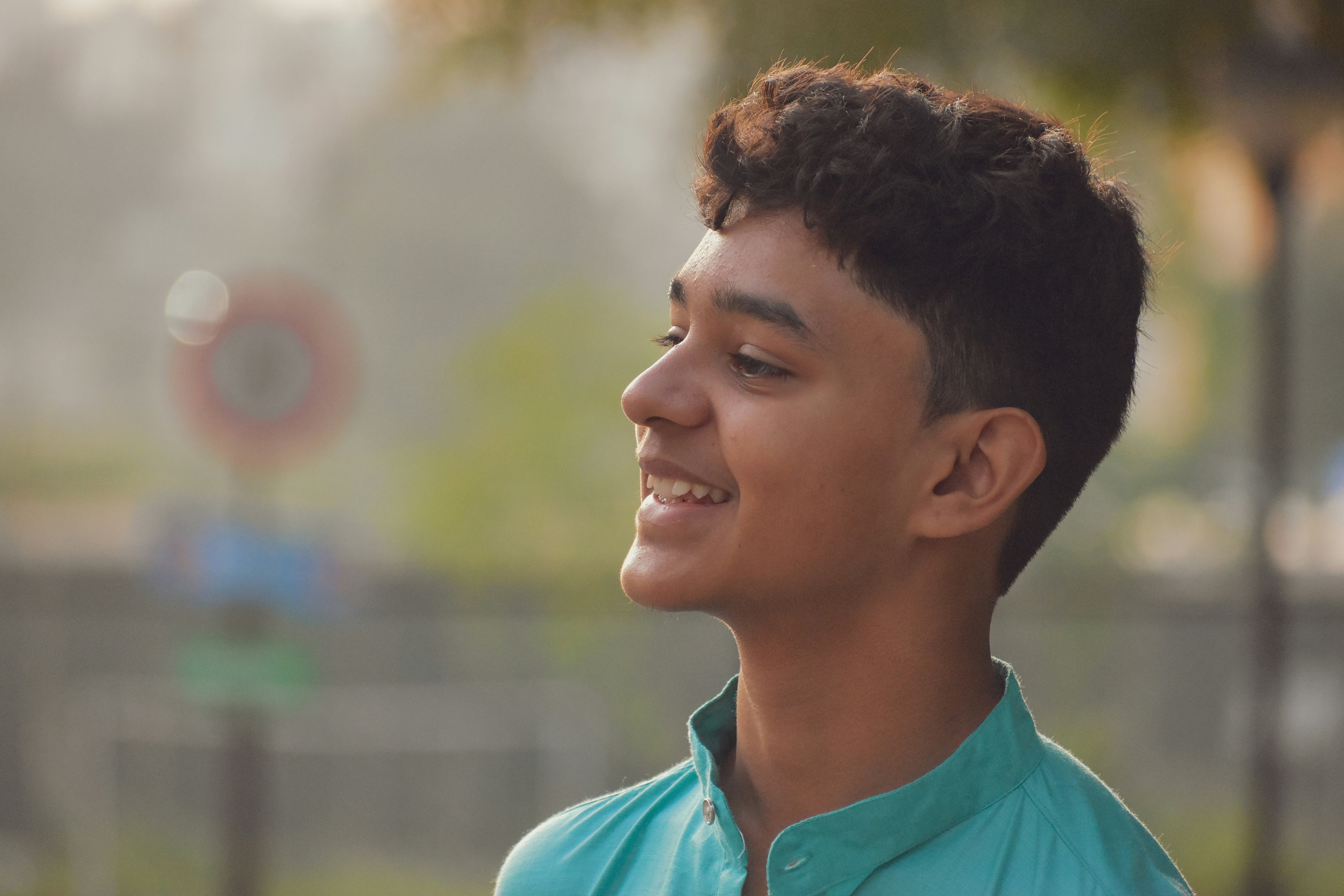 A person smiling outside photo – Free Bengaluru Image on Unsplash