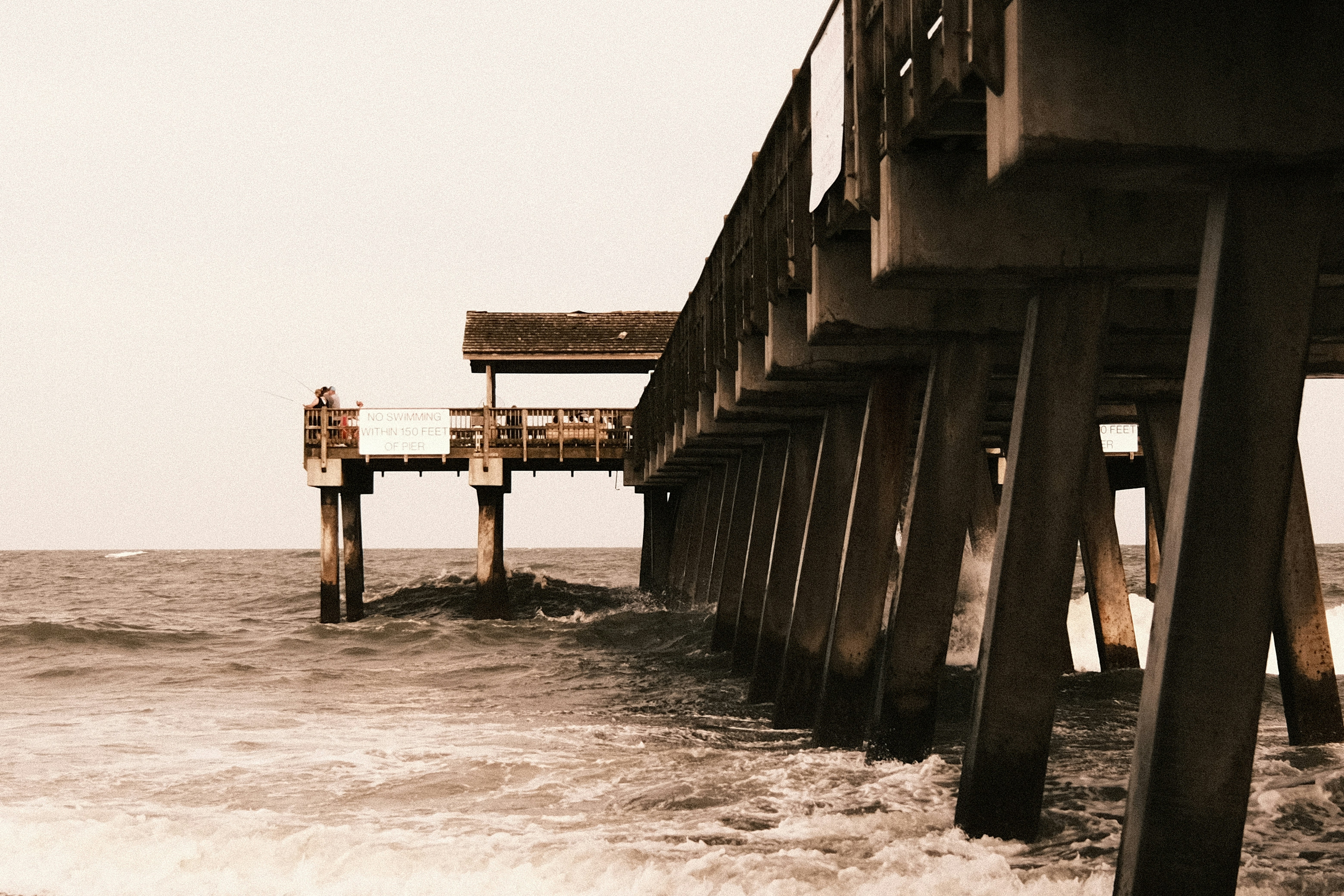A wooden pier over water photo – Free Ga Image on Unsplash
