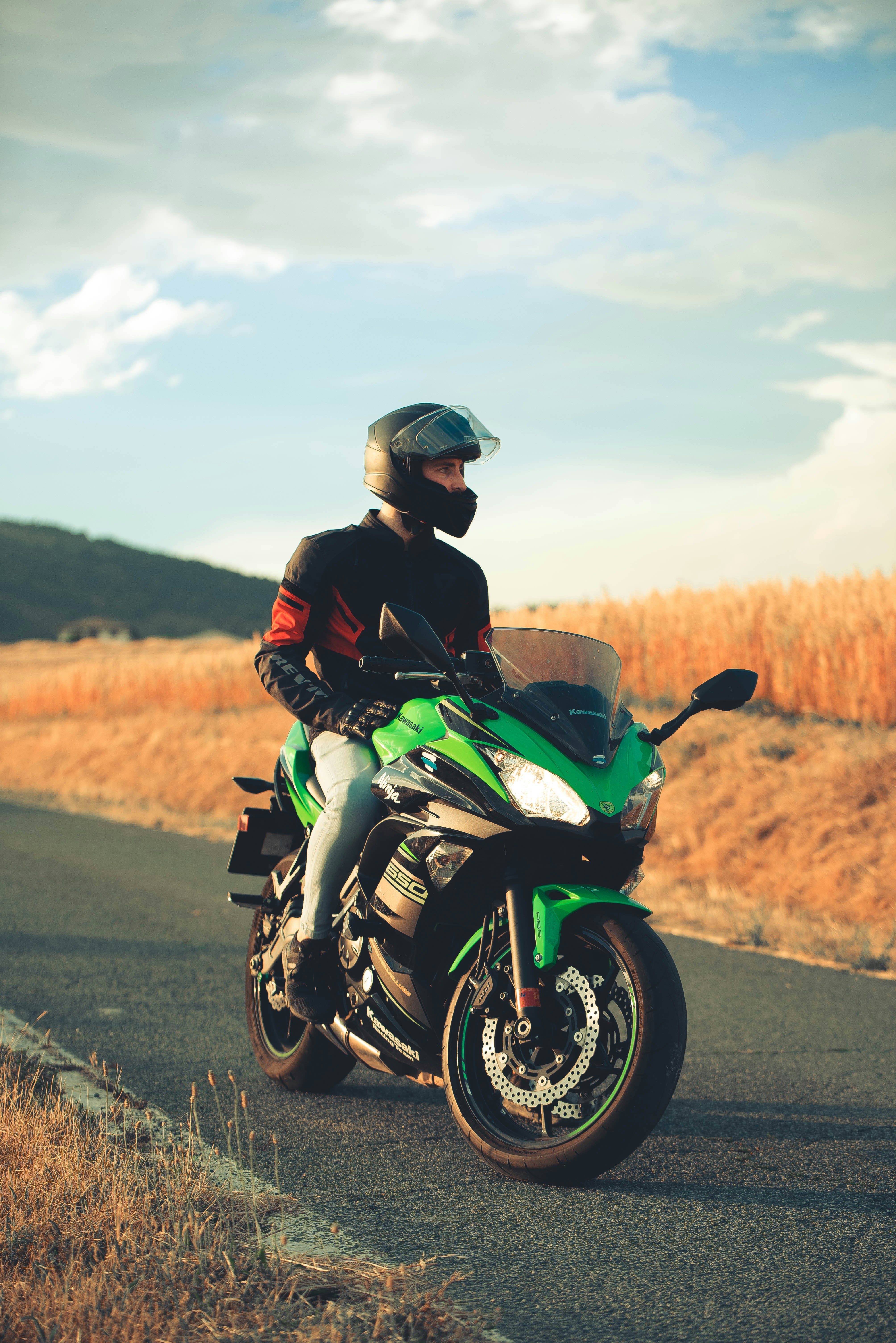 A man on a motorcycle photo – Free Motorcycle Image on Unsplash