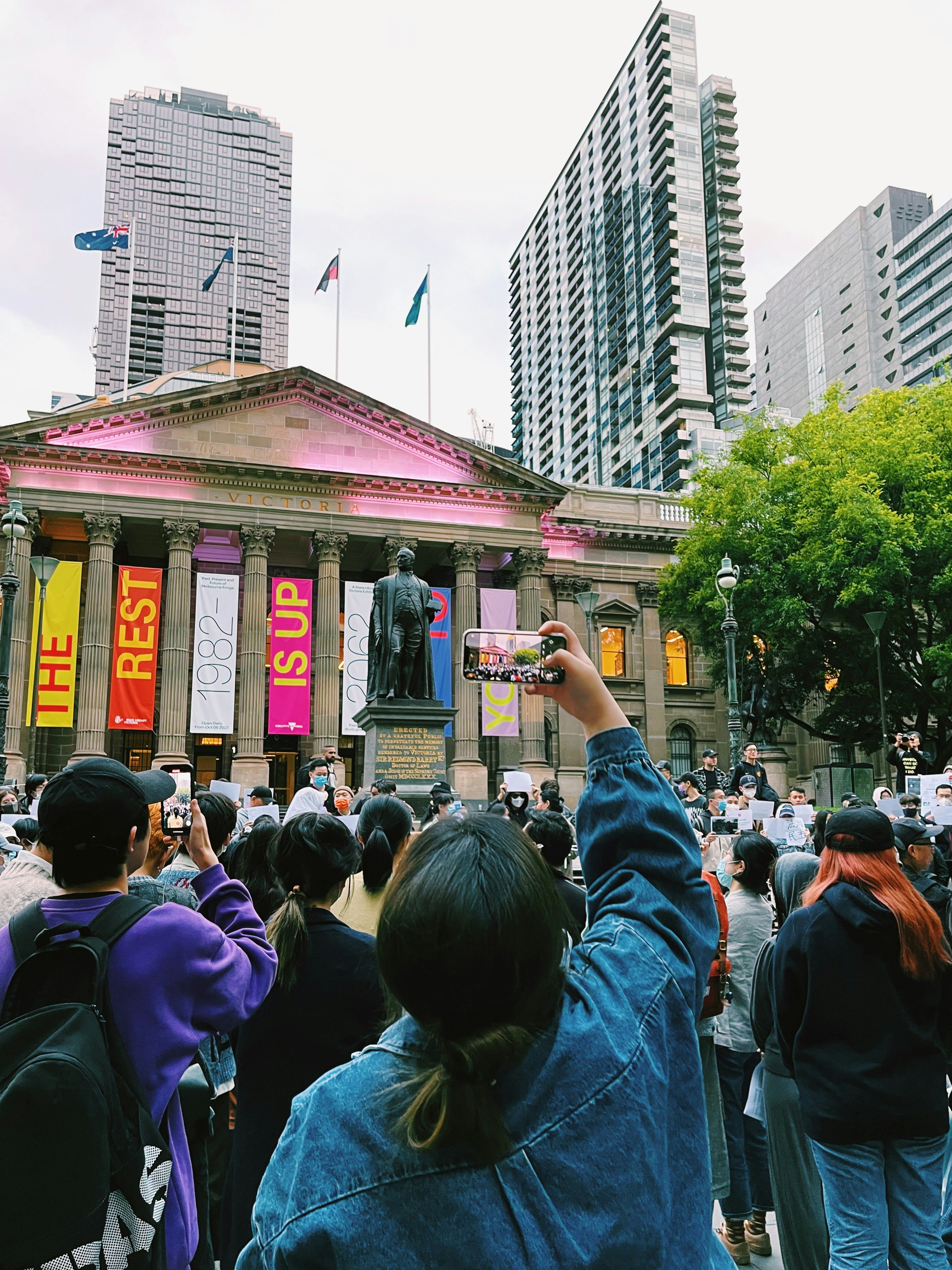 A crowd of people outside a building photo – Free Melbourne Image on ...