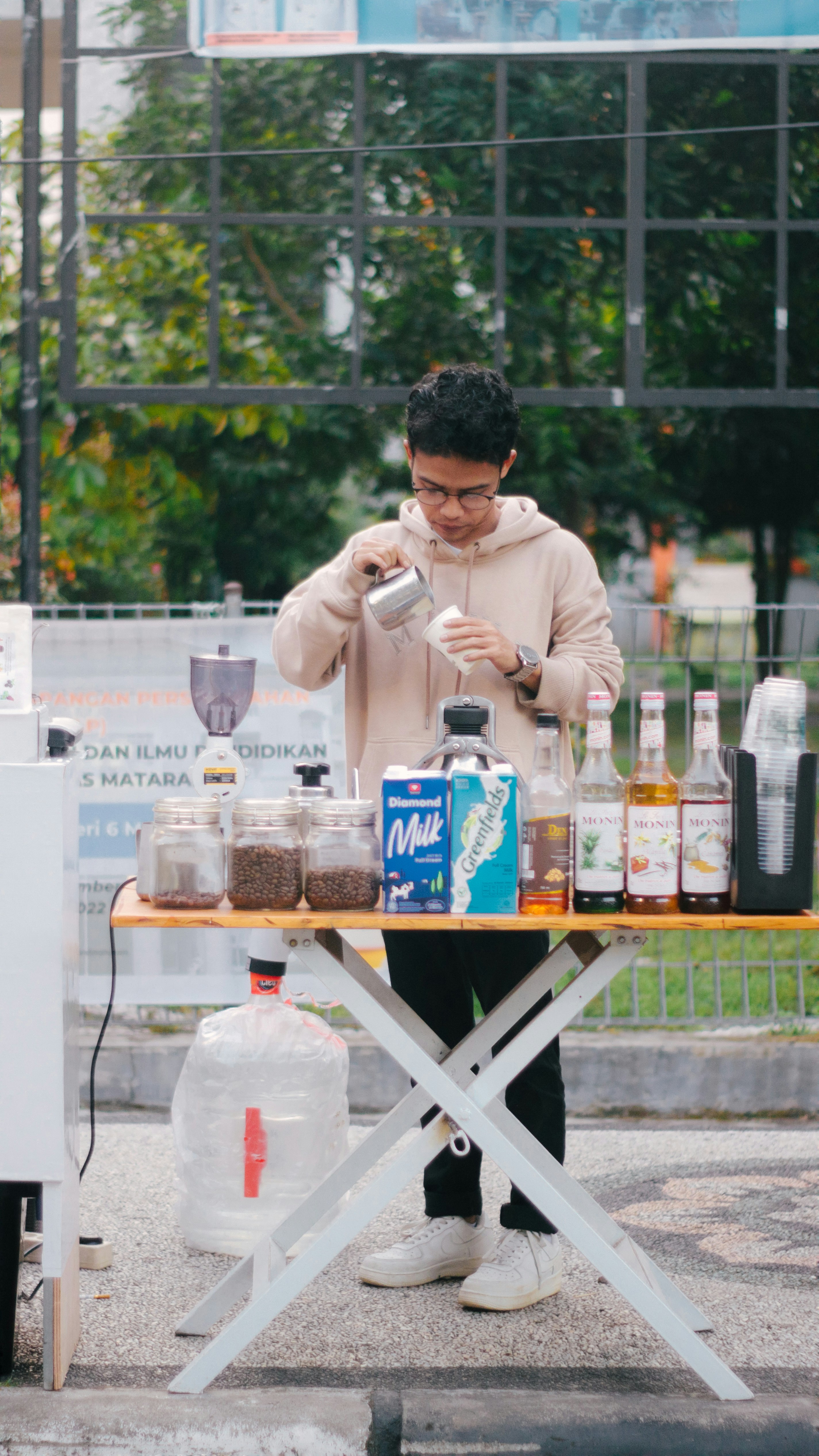 Outdoor Drink Station: A Casual Mixologist Crafts a Quick Pour