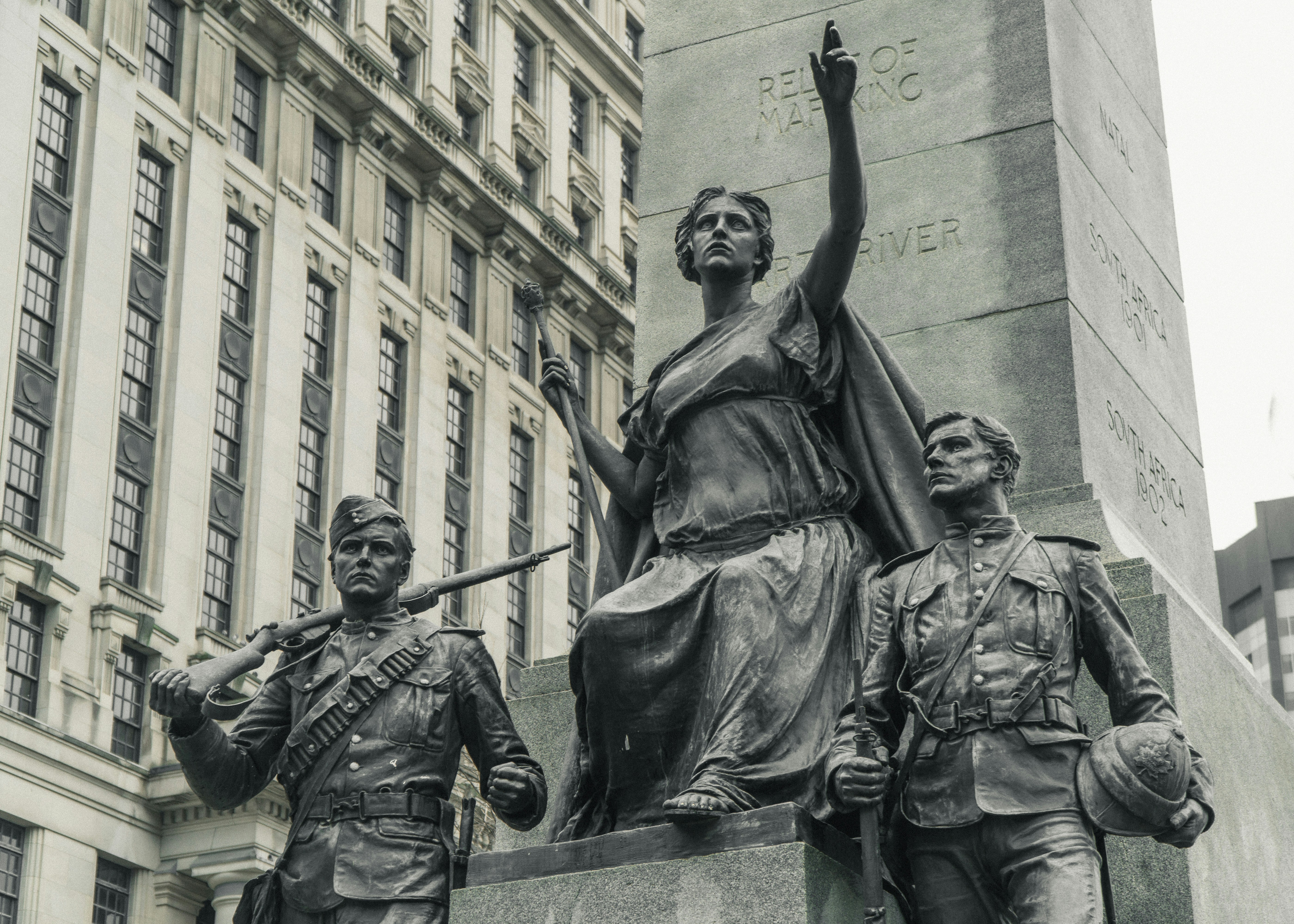A group of statues in front of a building photo – Free Toronto Image on ...