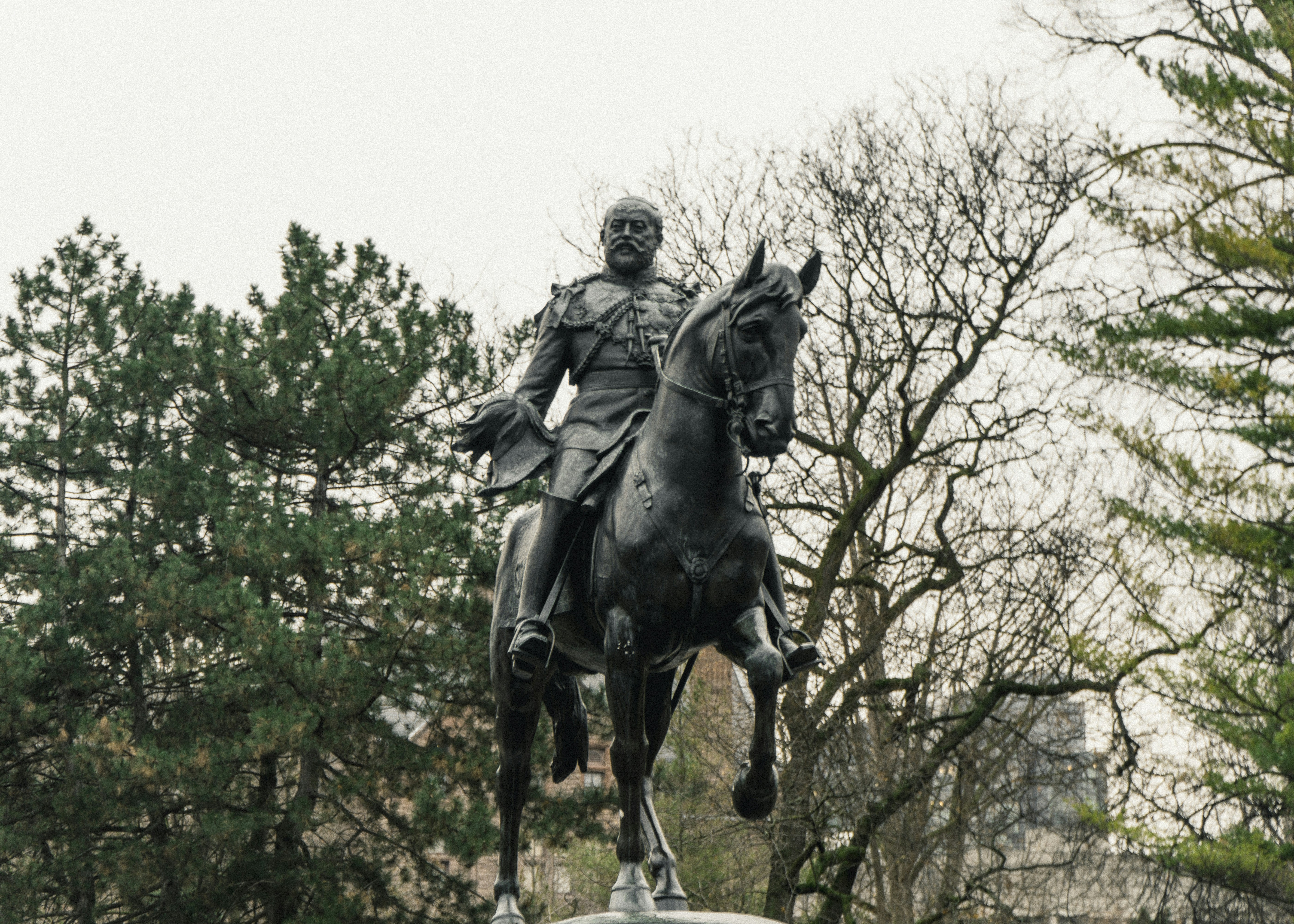 A statue of a person riding a horse photo – Free Toronto Image on Unsplash
