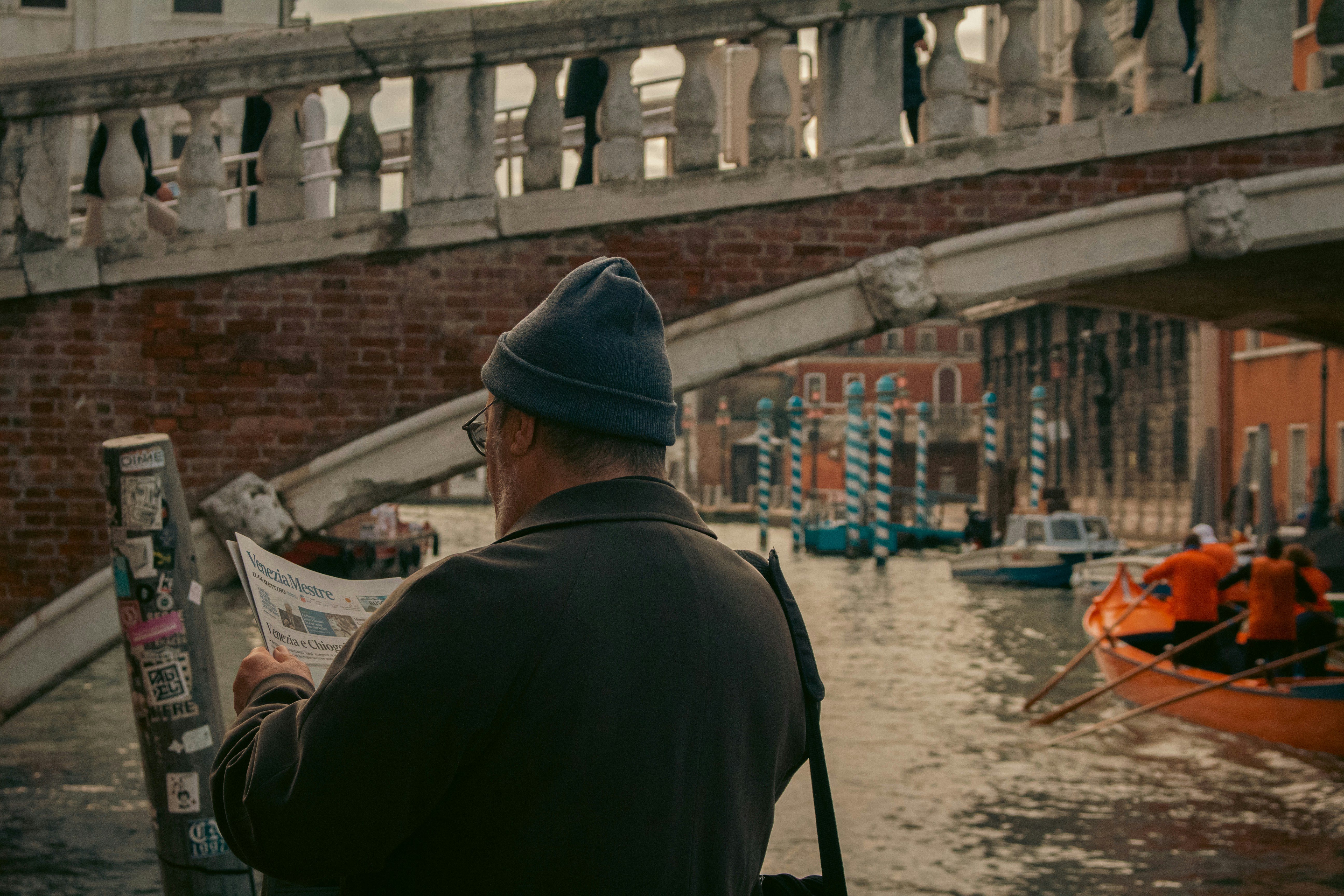 The Canal Reader: Quiet Focus Under the Stone Bridge