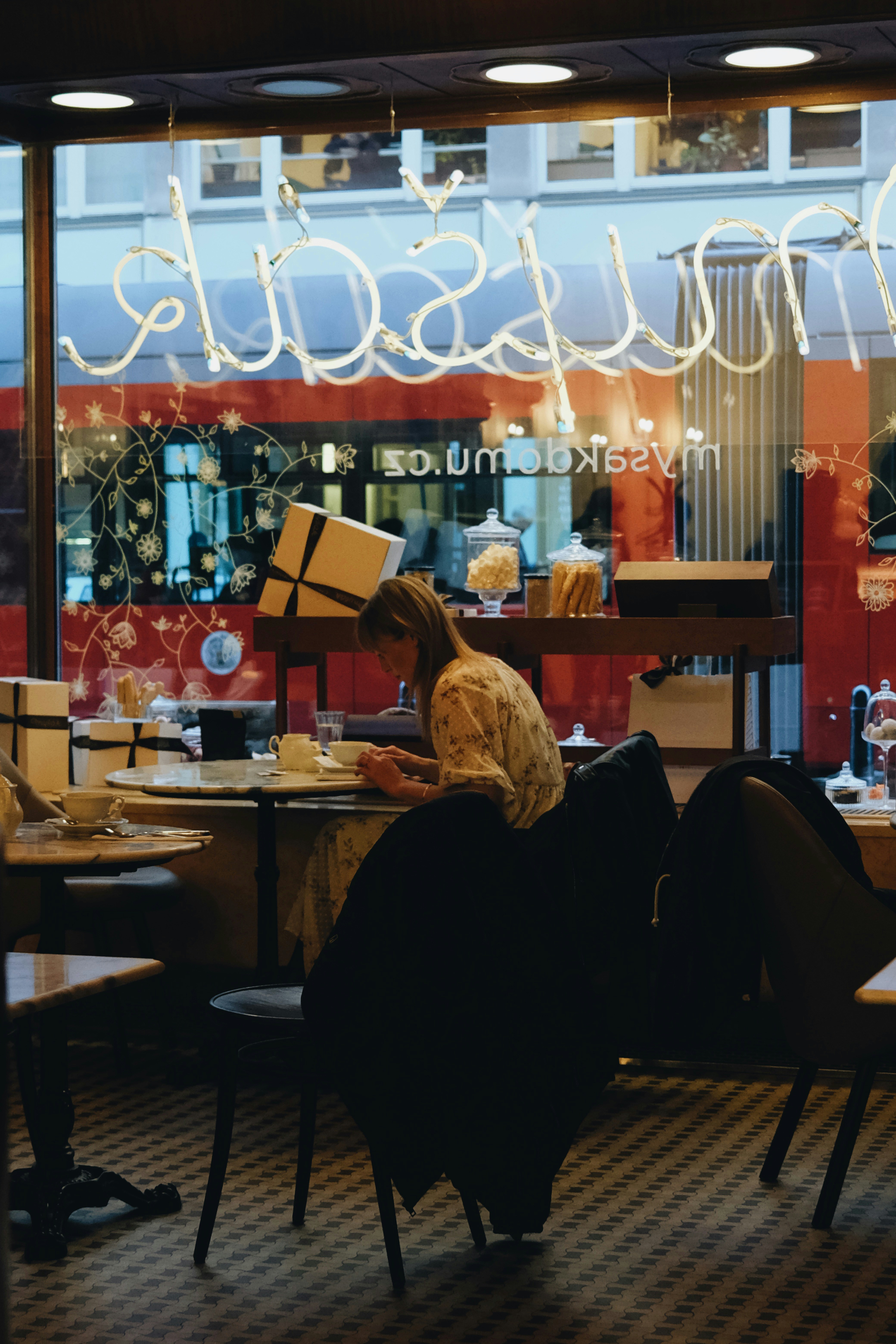 Quiet Study in a Sunlit Café
