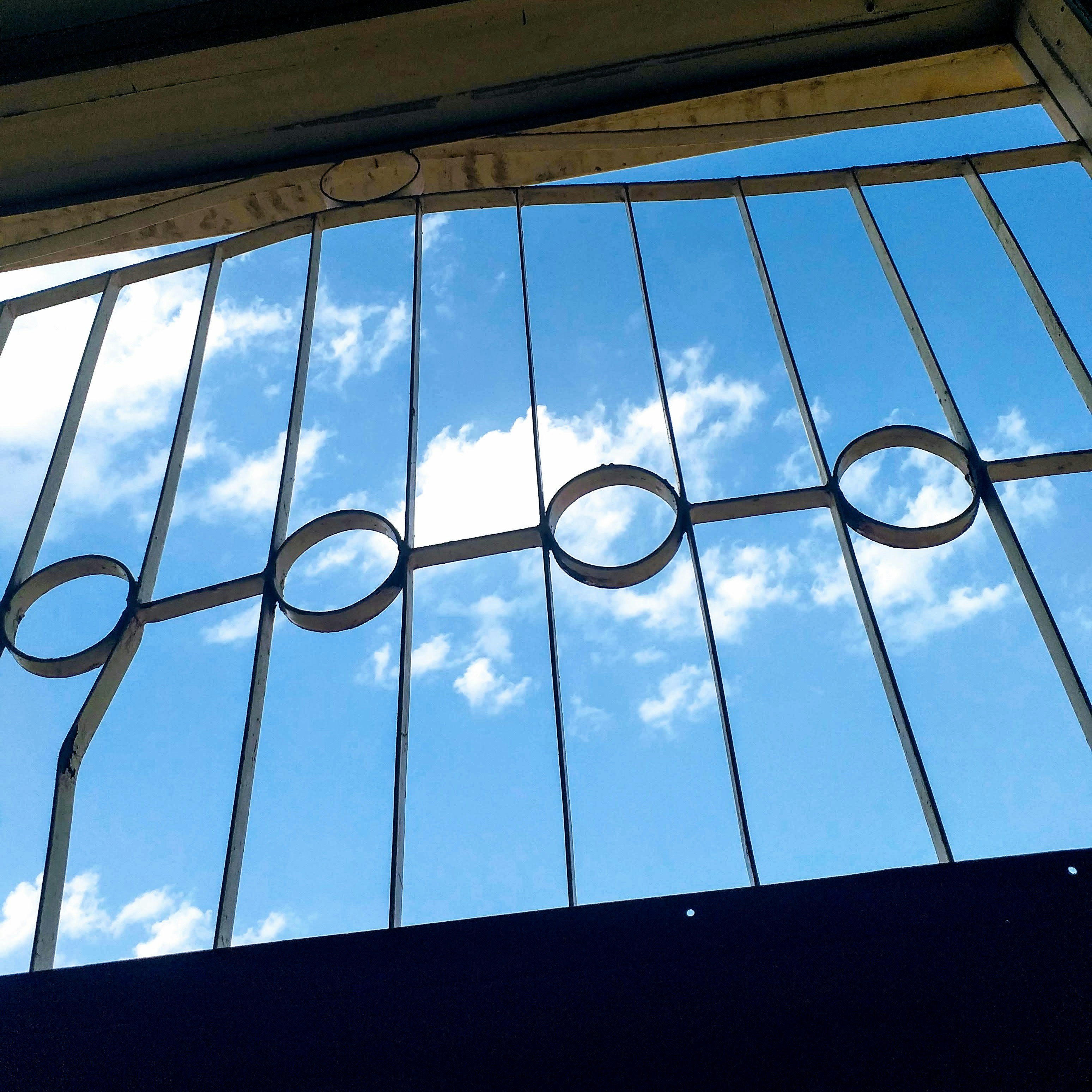 A view looking through a window at the sky photo – Free Window Image on ...