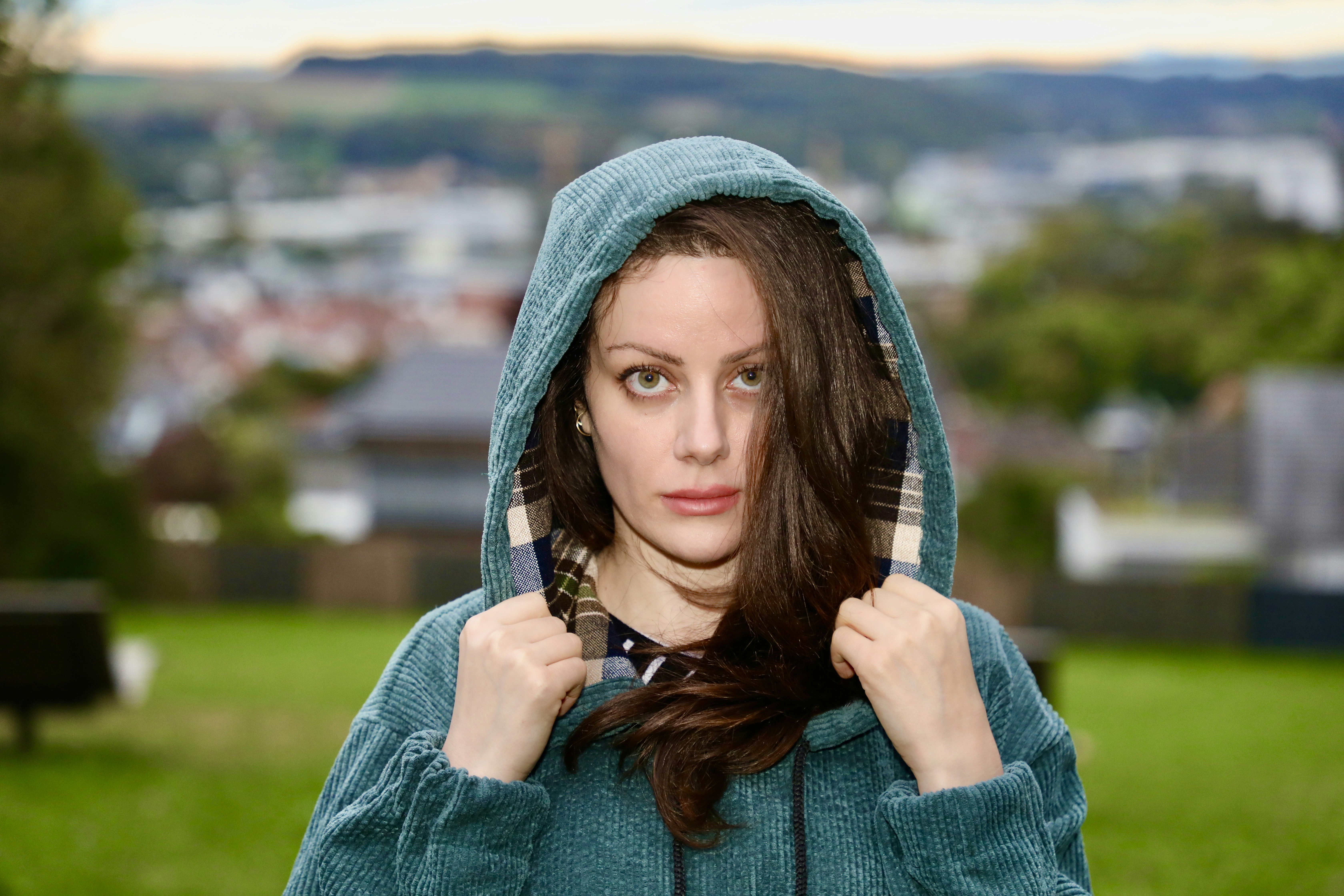 Hooded Portrait in a Verdant Field