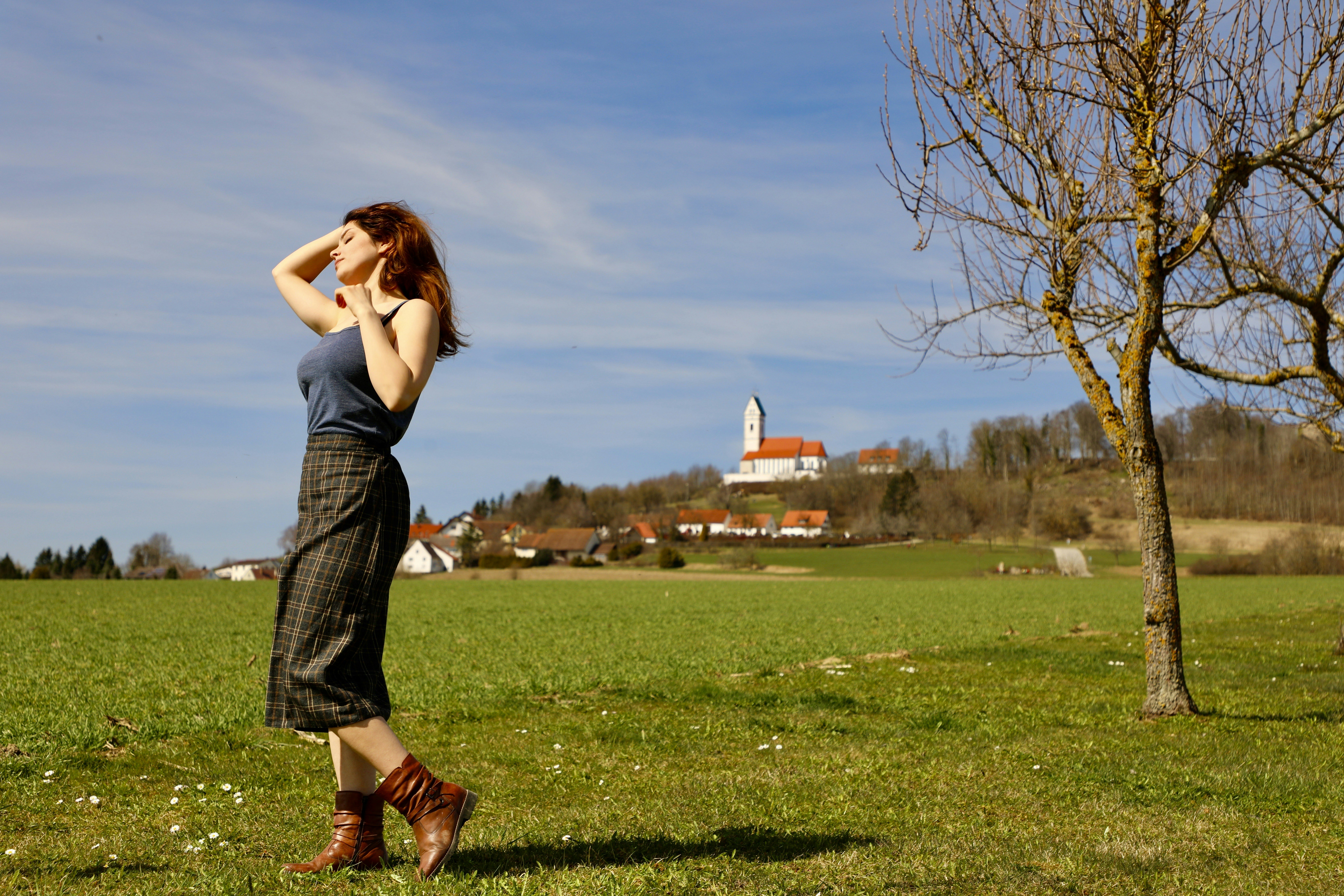 Sunlit Stride toward a Hilltop Church