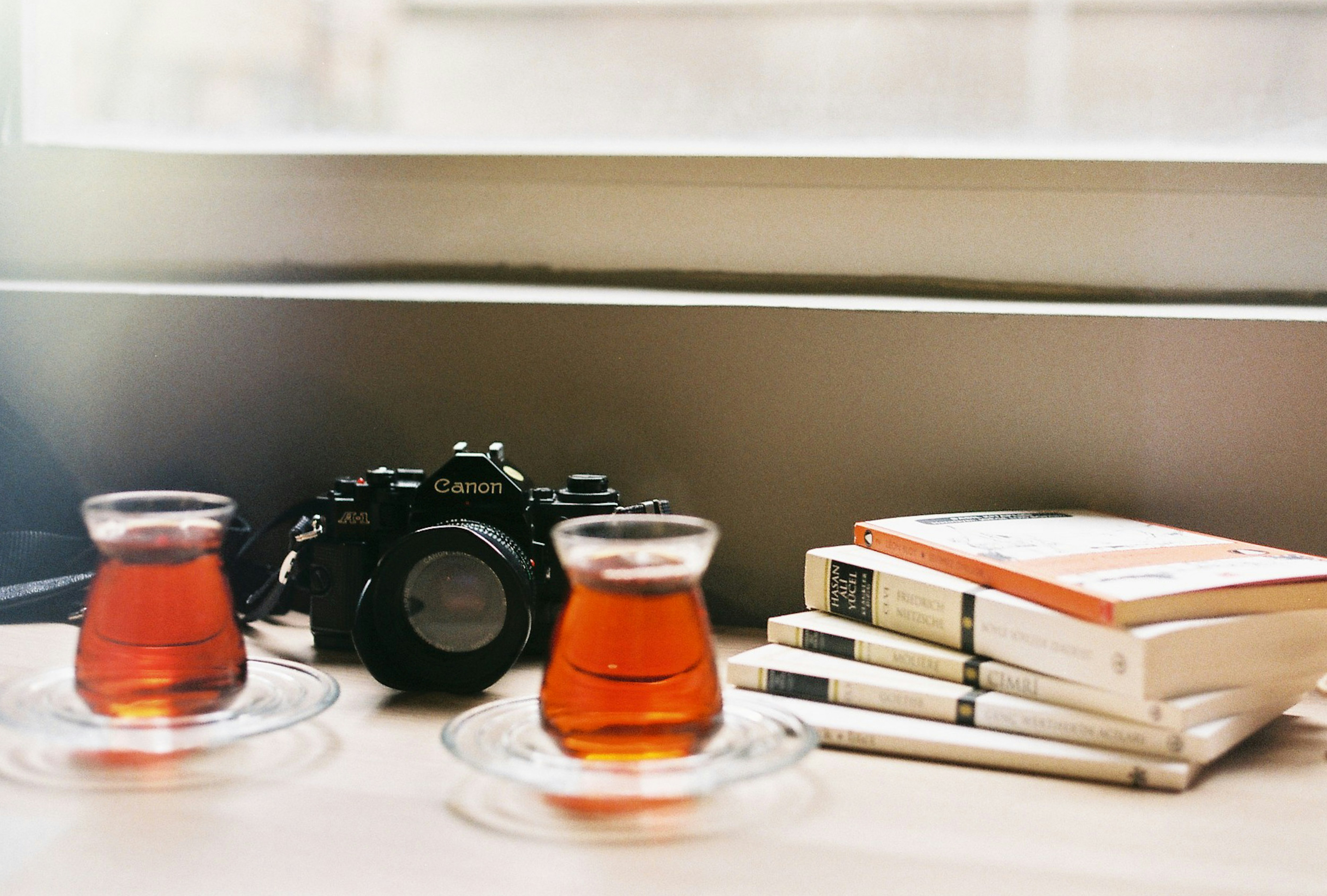Canon in Window Light: Tea, Books, and a Moment on the Table