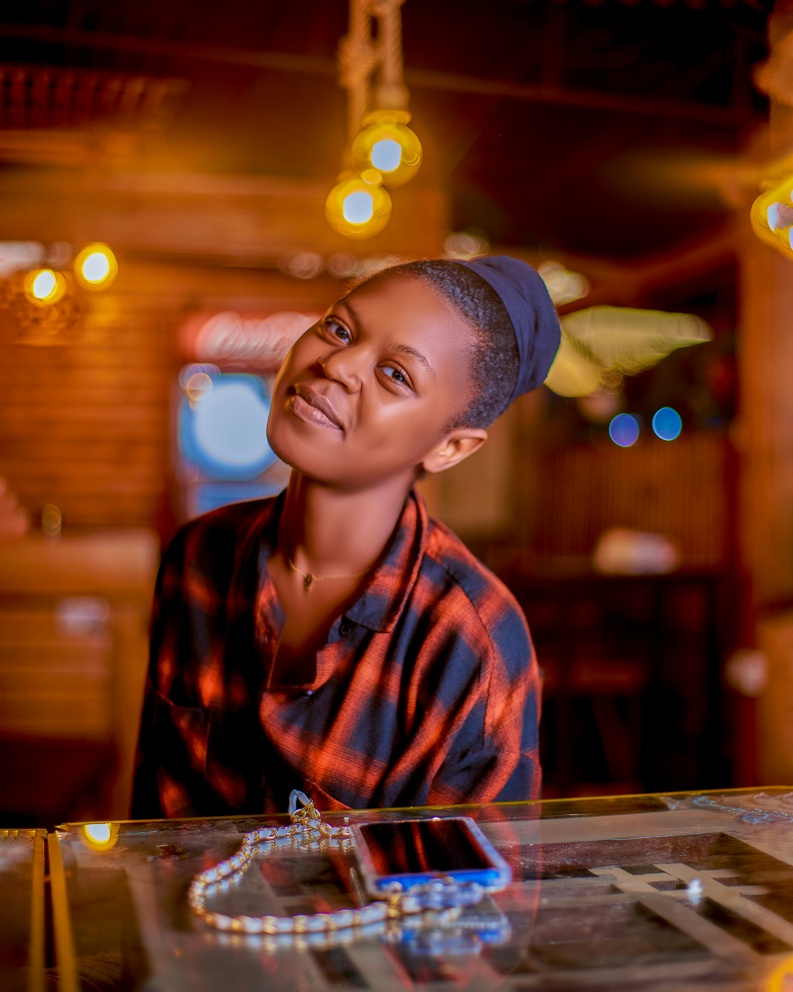 Warmth in Neon: A Quiet Moment at the Bar