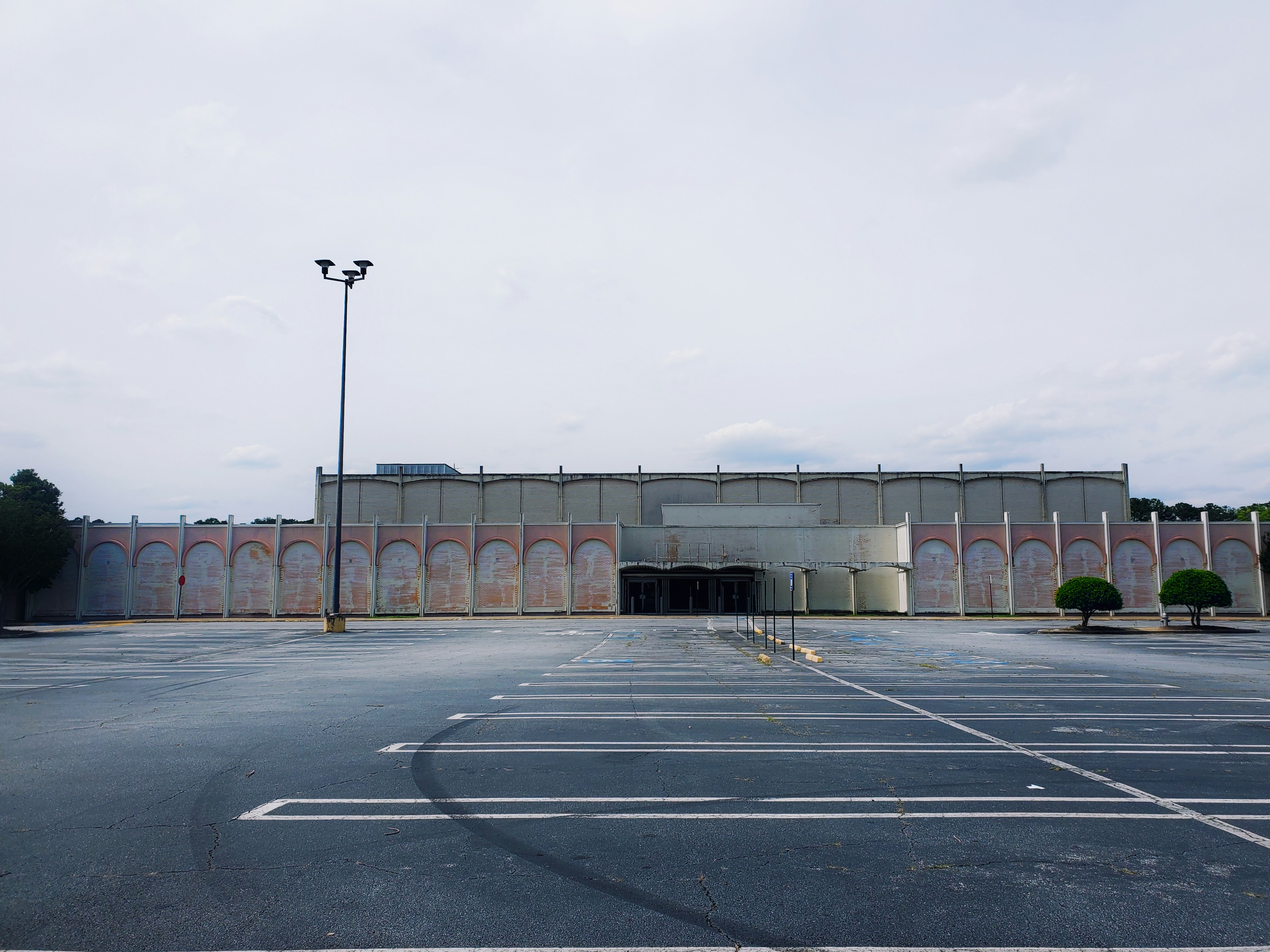A large building with a parking lot photo – Free North dekalb mall ...
