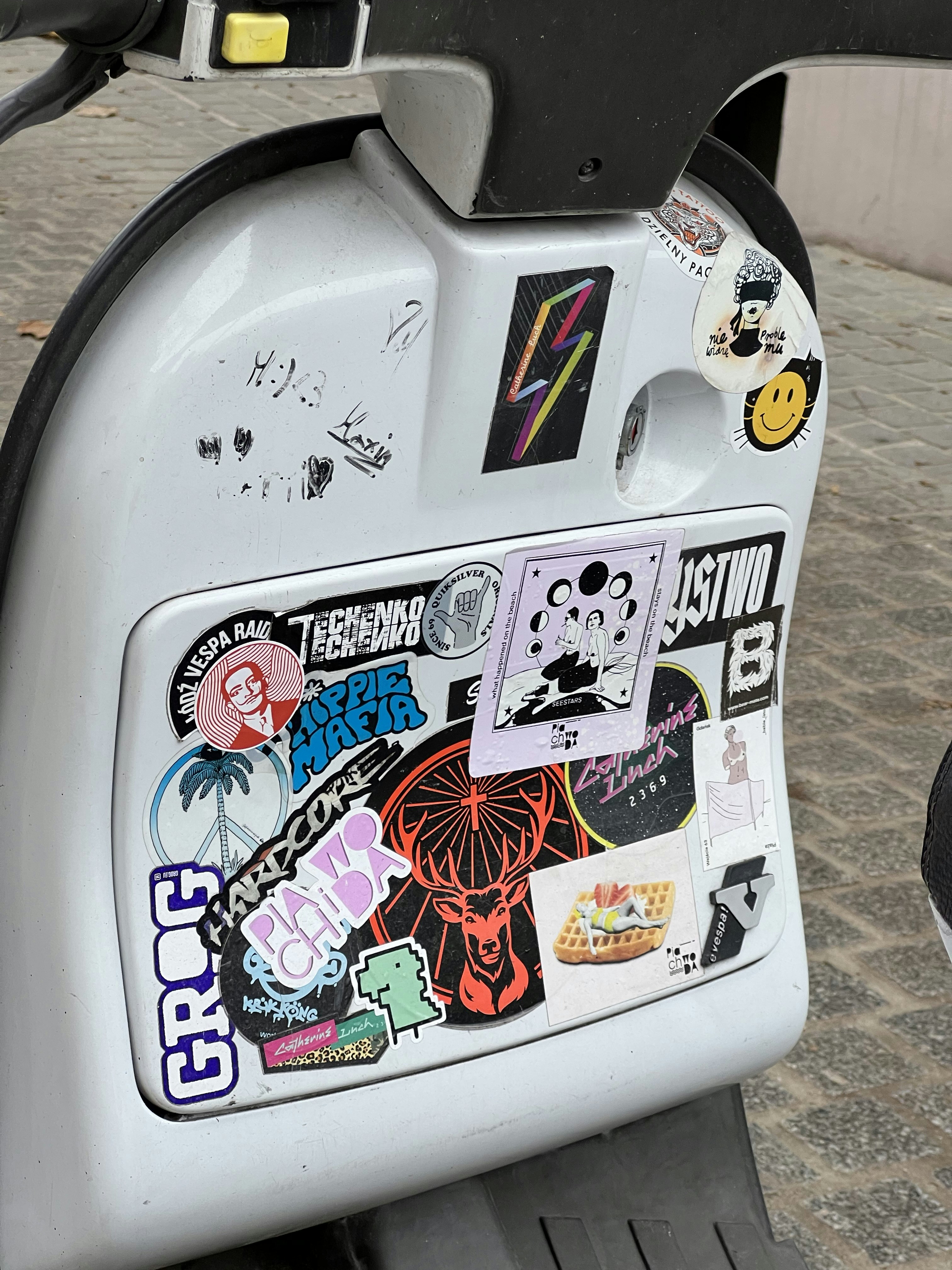 Stickered Scooter Panel: A Patchwork of Urban Colorfulness